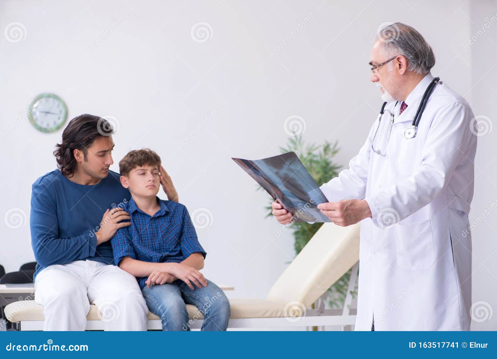 Young Boy Visiting Doctor in Hospital Stock Image - Image of examining ...
