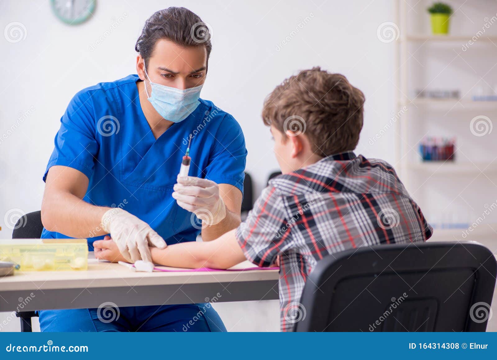Young Boy Visiting Doctor in Hospital Stock Photo - Image of donation ...