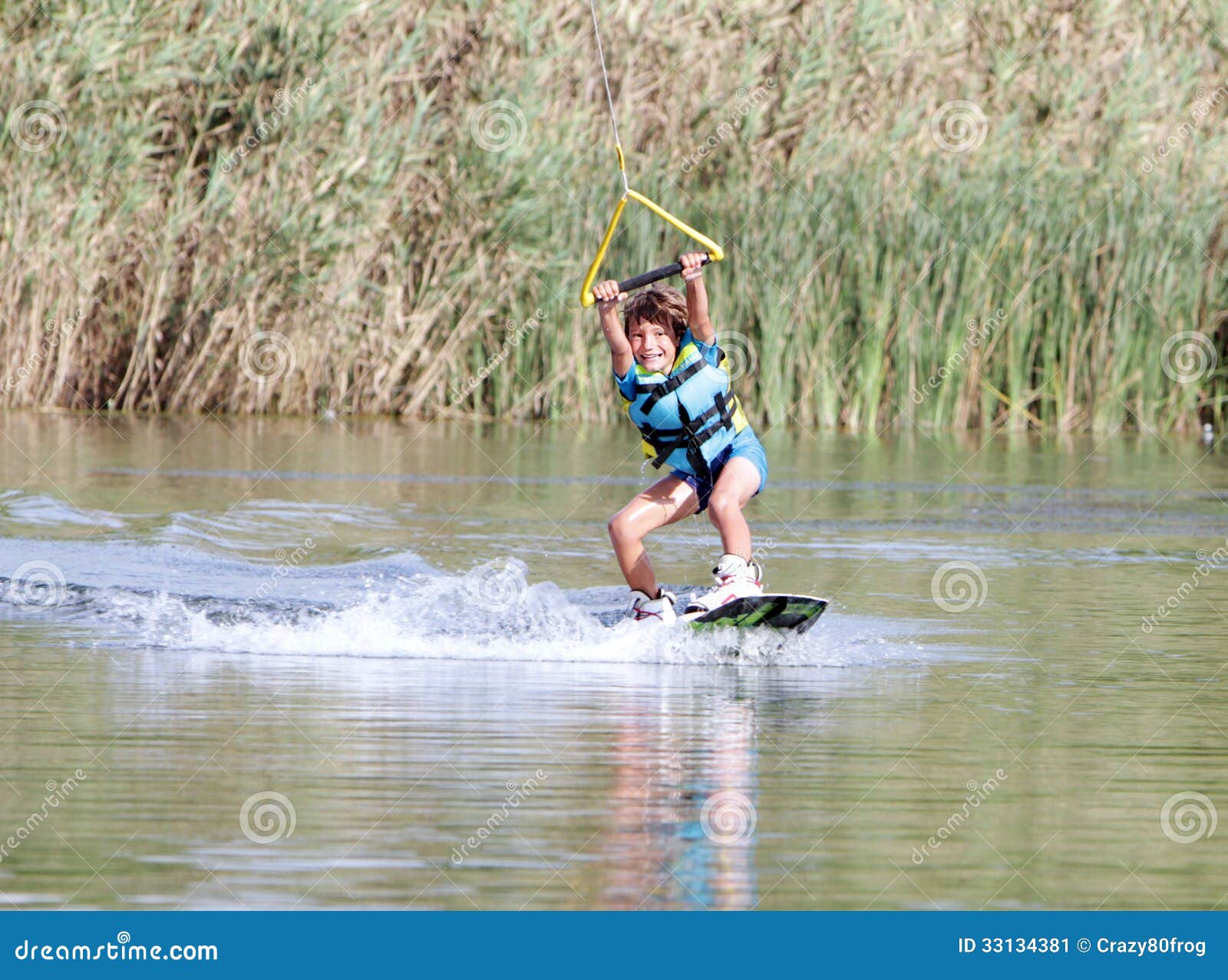 Young boy wakeboarding stock image. Image of life, activity - 33134381