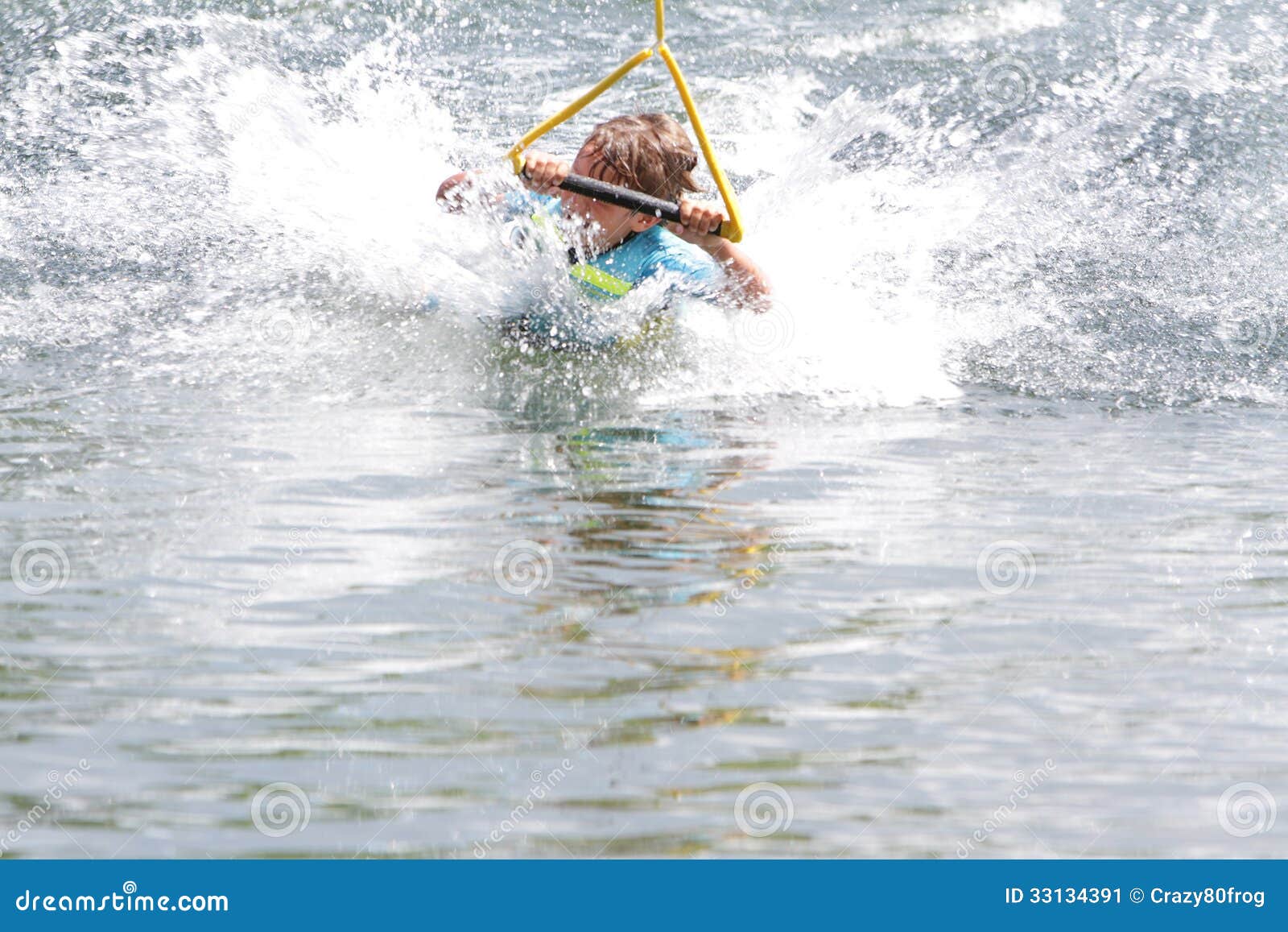 Young boy wakeboarding stock image. Image of activity - 33134391