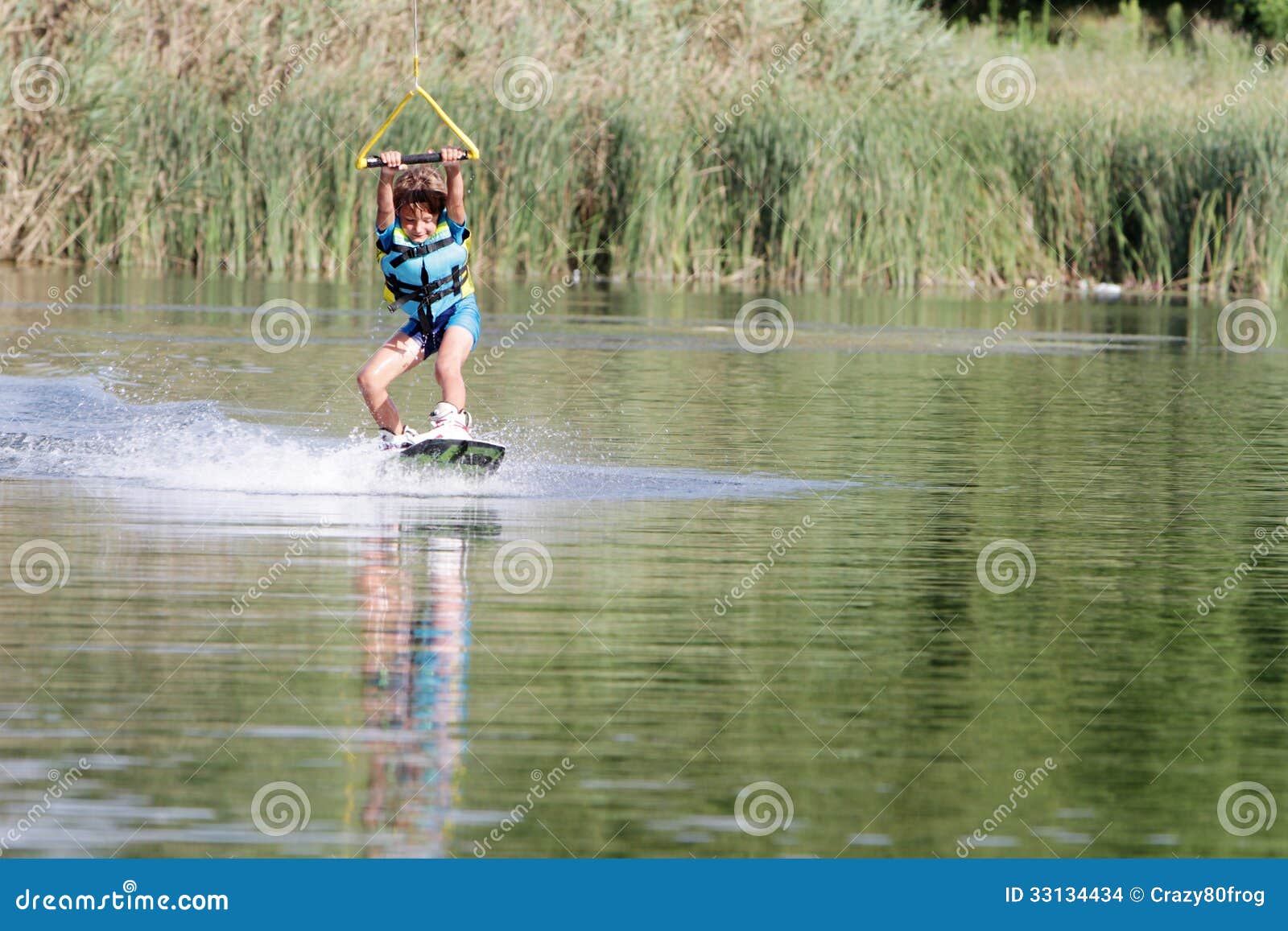 Young boy wakeboarding stock photo. Image of lesson, active - 33134434
