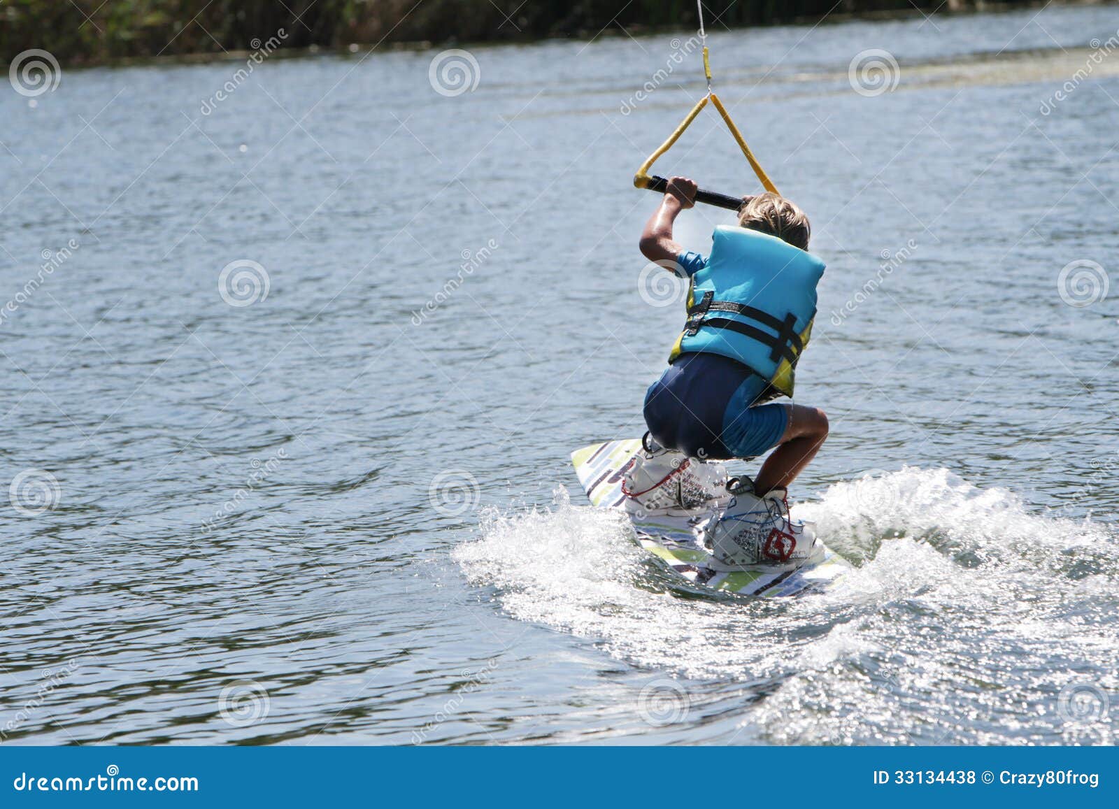 Young boy wakeboarding stock photo. Image of extreme - 33134438