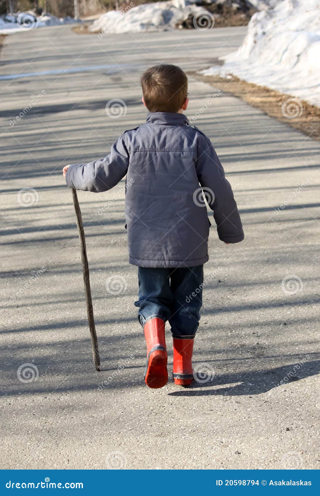 Young Boy Walking stock photo. Image of single, stick - 20598794