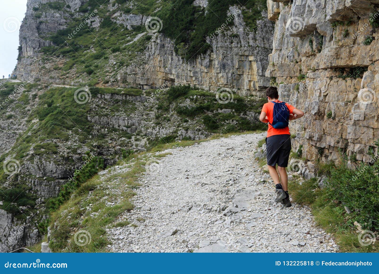Young Boy Walks a Difficult Path on the Alps Stock Photo - Image of ...