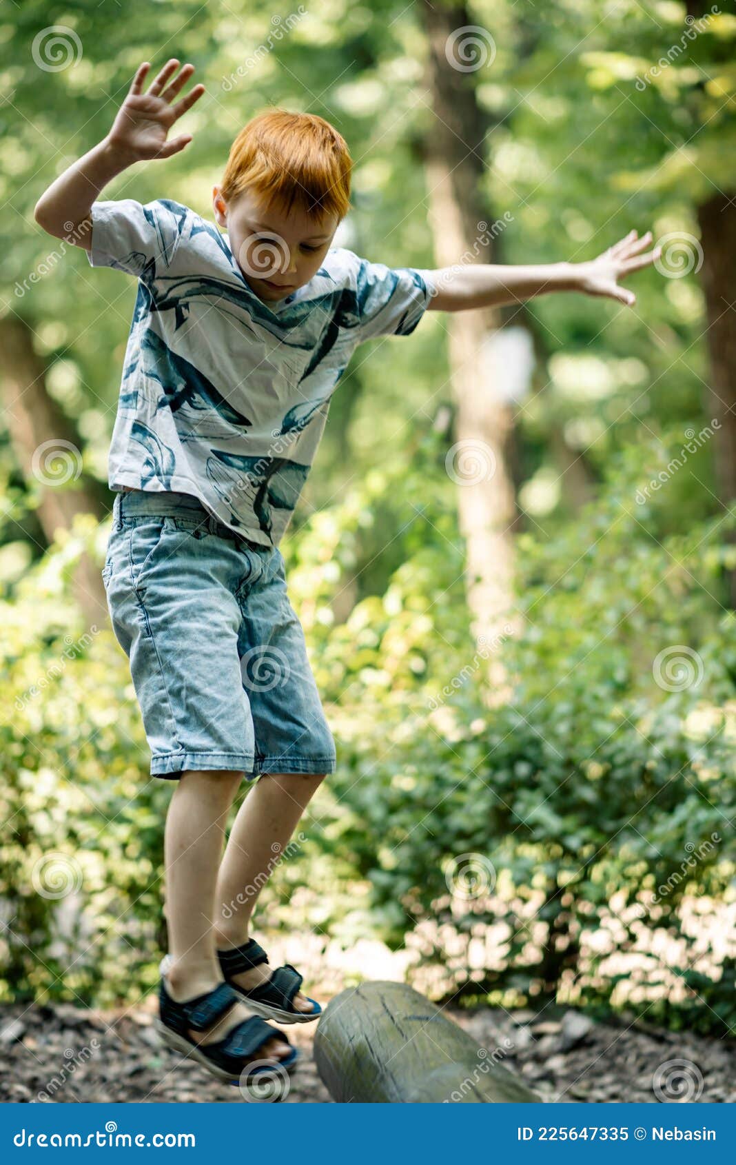 A Young Boy Walks on a Log at the Playground. Active Summer Vacation ...