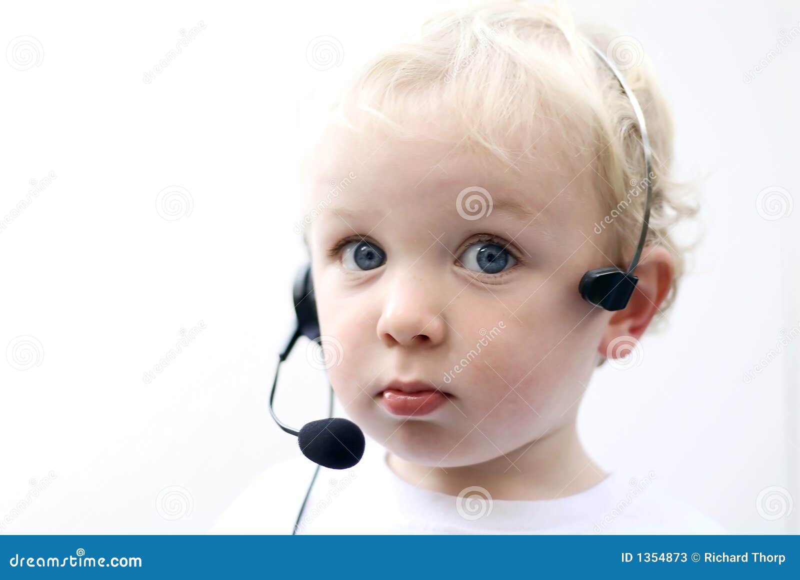 Young Boy Wearing Phone Headset II Stock Image - Image of hear, listen ...