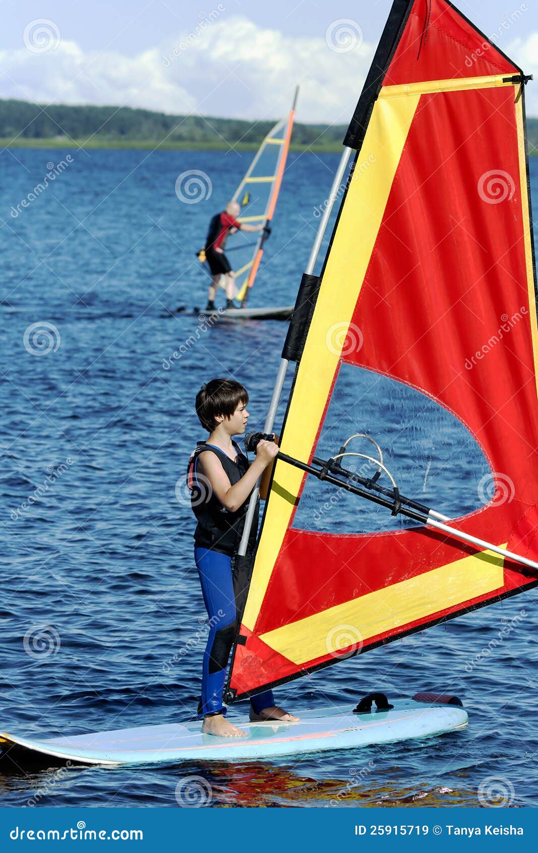 Young boy on windsurfing stock image. Image of equipment - 25915719