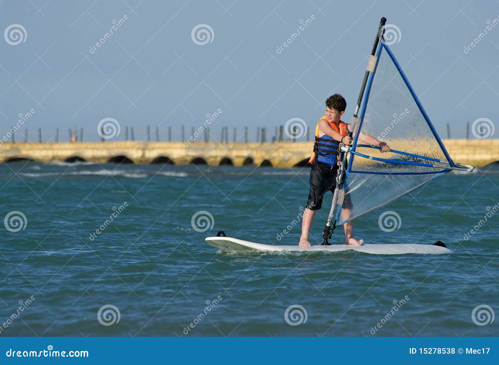 Young Boy Windsurfing and Having Fun Stock Photo - Image of marine ...