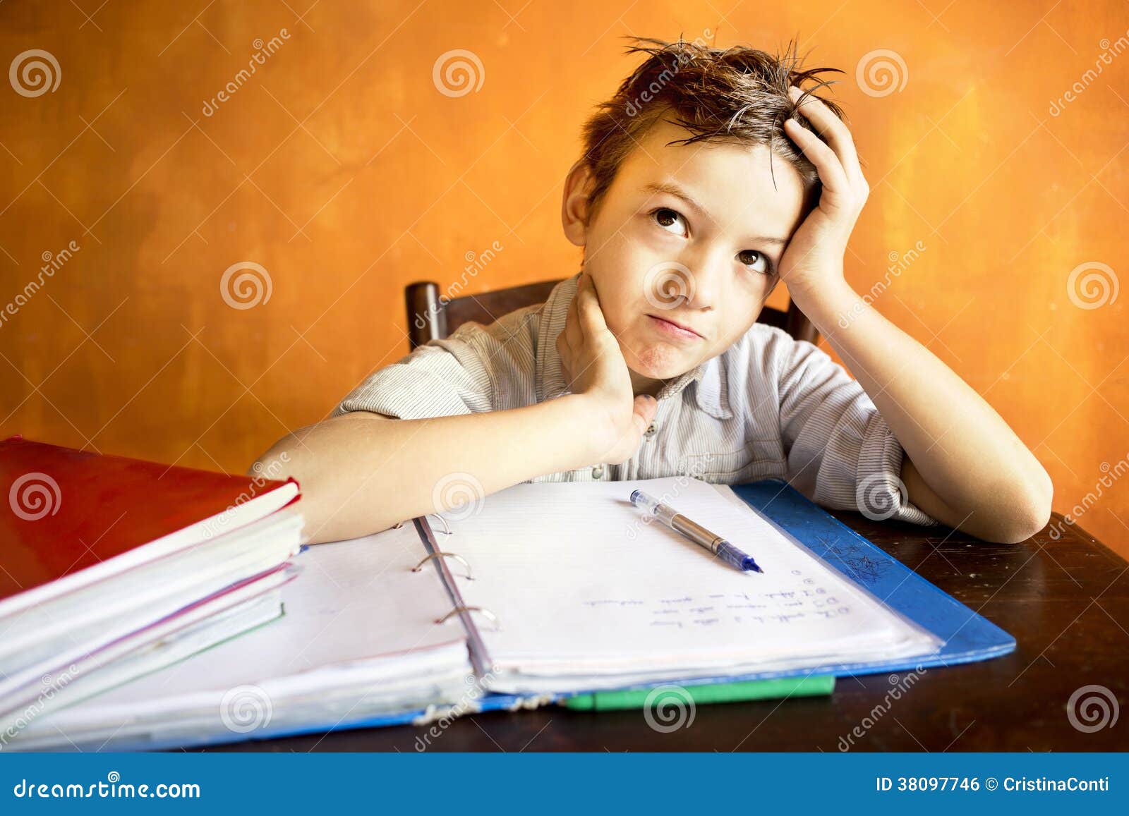 A Young Boy Worried on Homework Stock Photo - Image of caucasian, boys ...