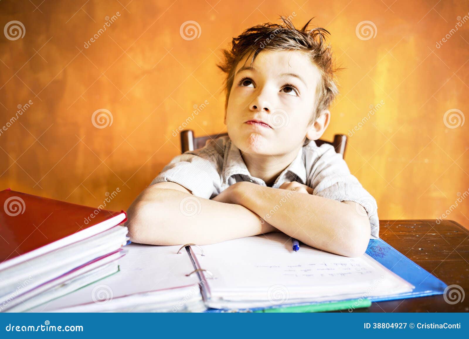 A Young Boy Worried and Stressed on Homework Stock Image - Image of ...