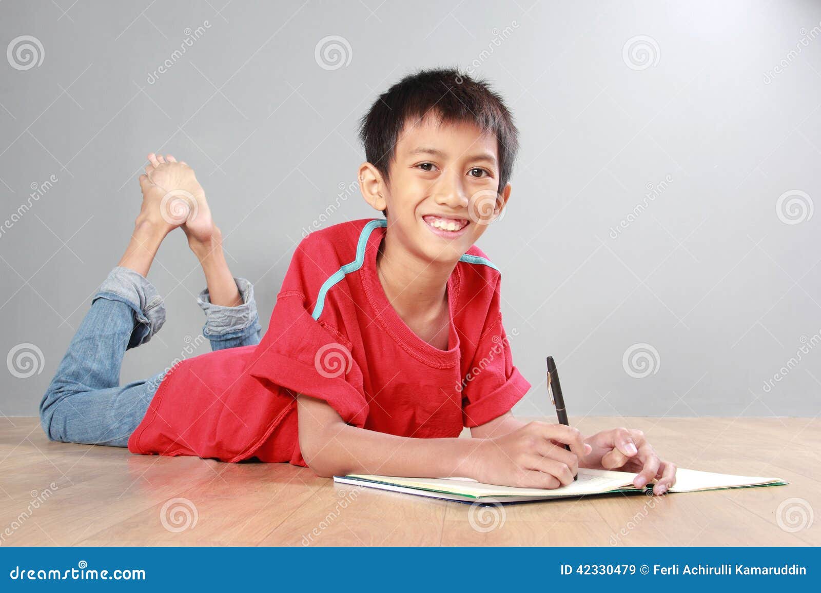 Young Boy Writing on the Floor Stock Image - Image of student, male ...
