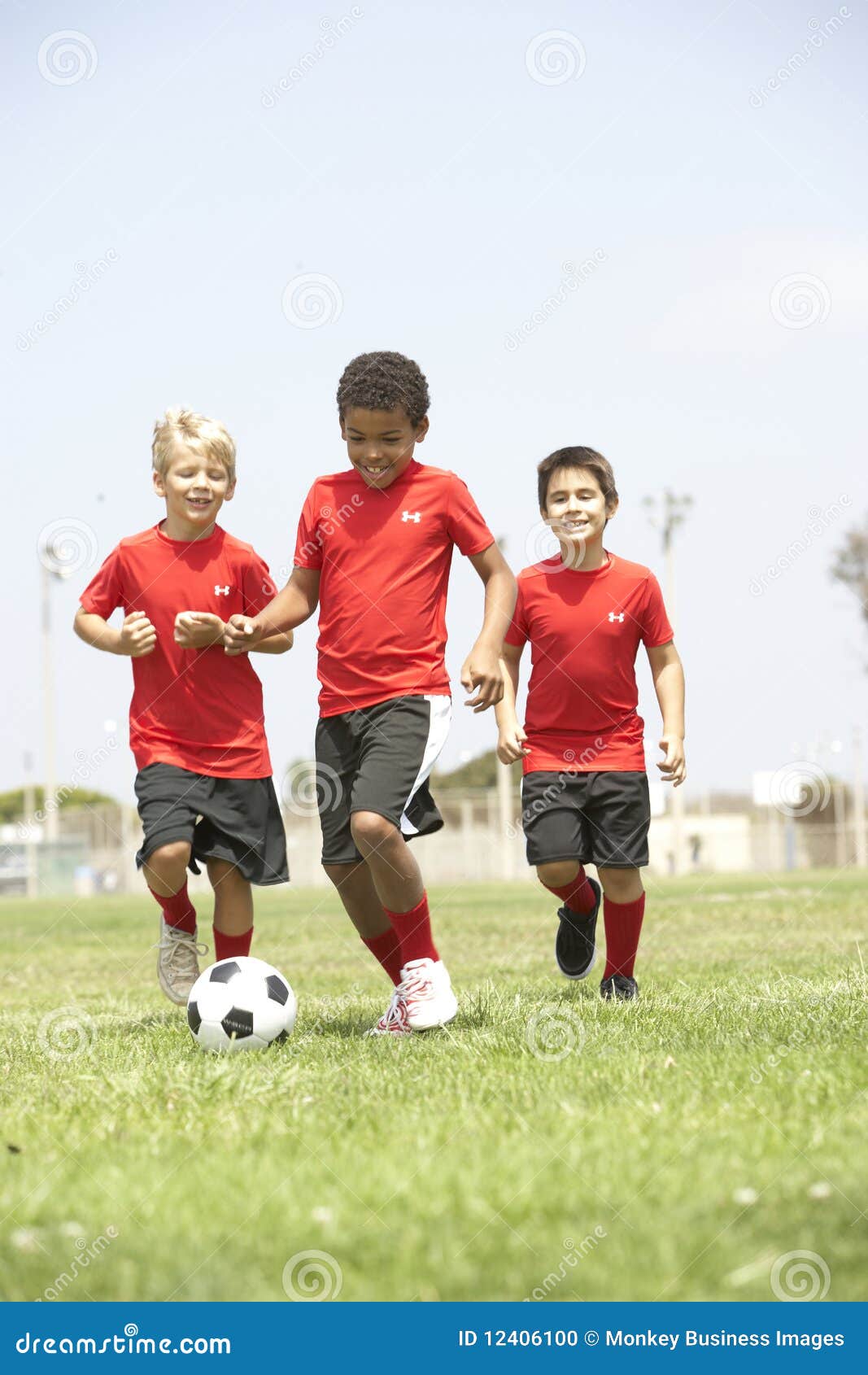 Young Boys in Football Team Stock Photo - Image of nine, caucasian ...