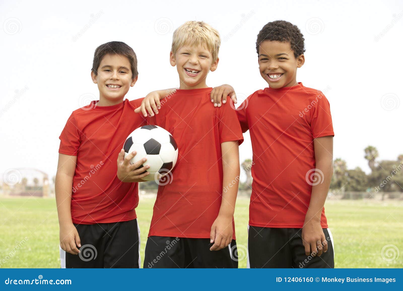 Young Boys in Football Team Stock Photo - Image of african, camera ...