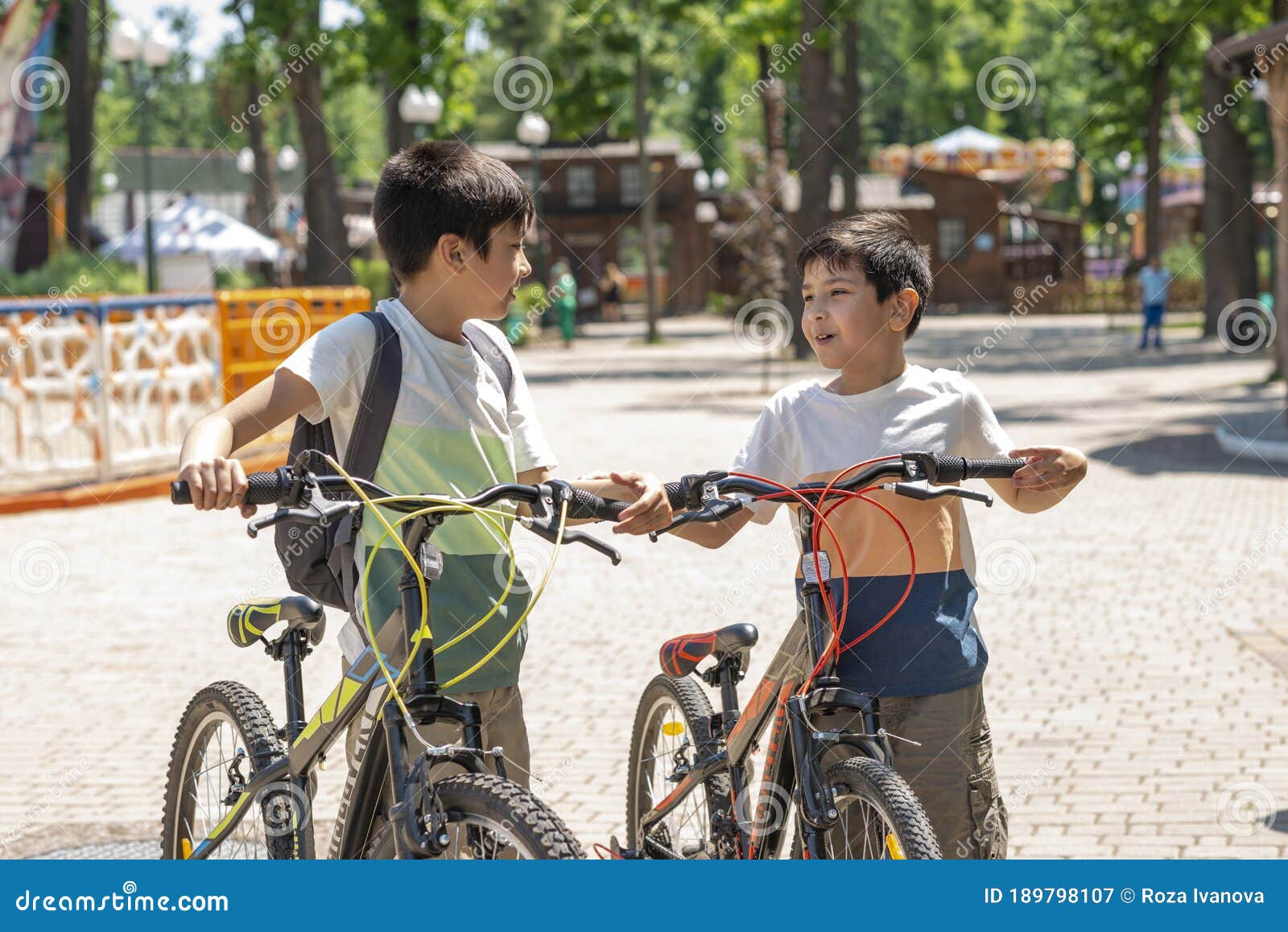 Young Boys Playing Outside with Bicycle Stock Image - Image of healthy ...