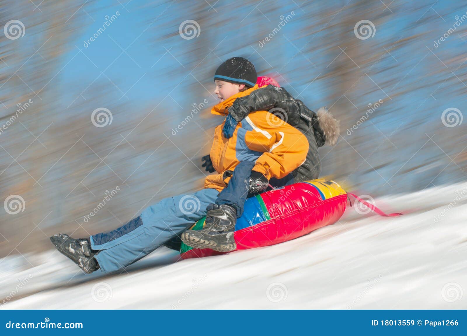 Young Boys Sledding Downhill Together Stock Image - Image of cheerful ...
