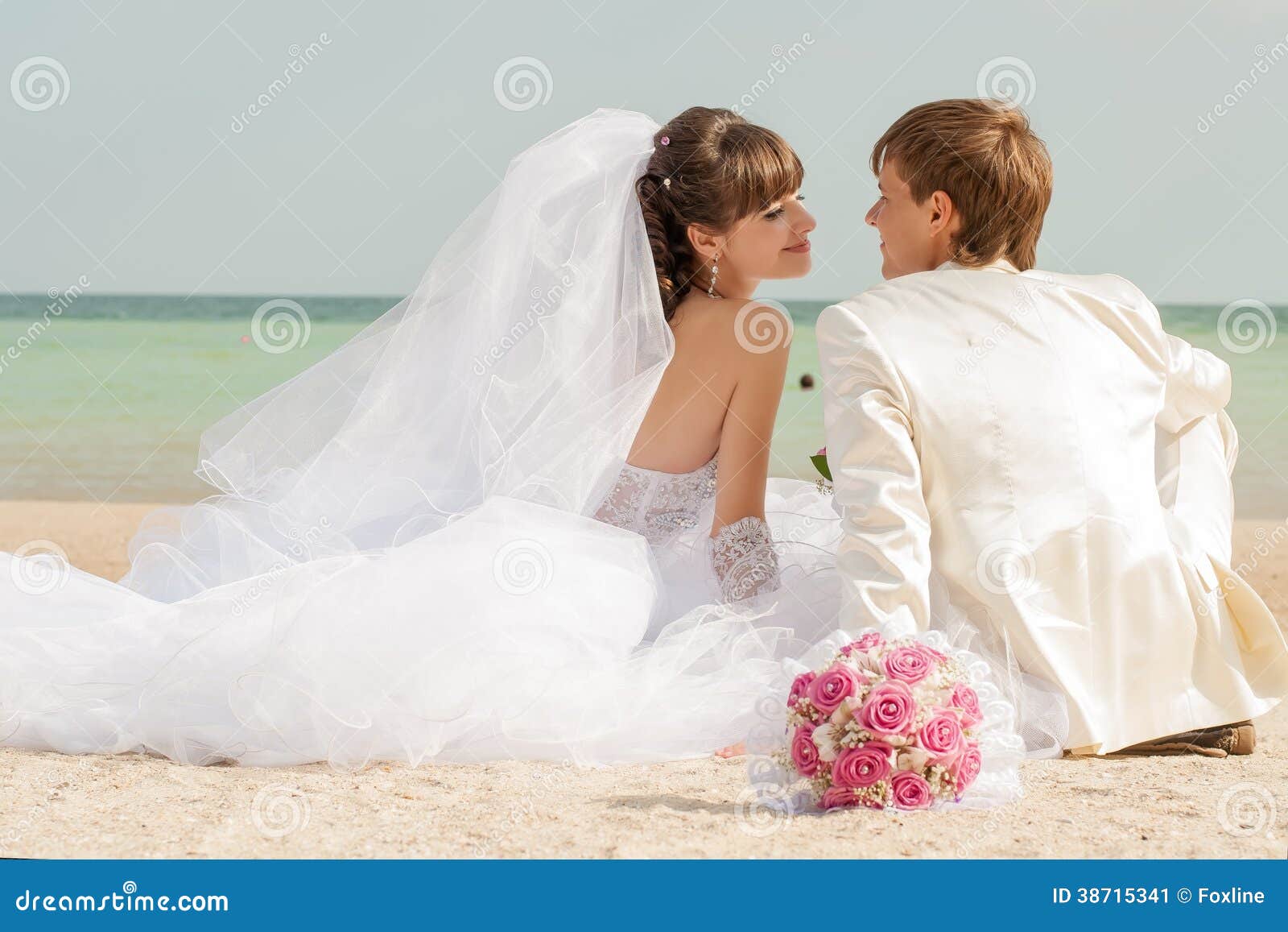 Young Bride and Groom on the Beach Stock Image - Image of celebrations ...