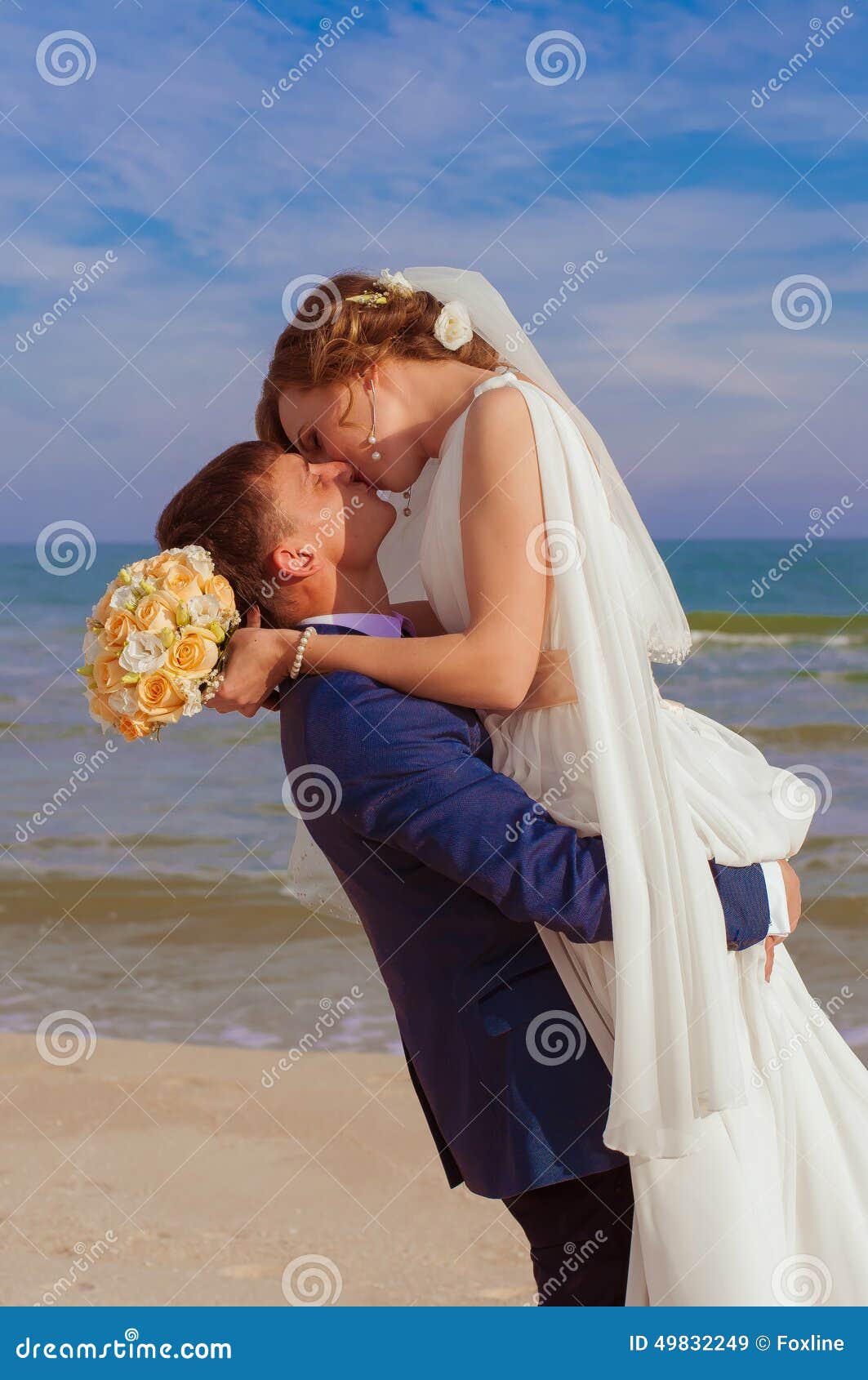 Young Bride and Groom on the Beach Stock Image - Image of couple ...