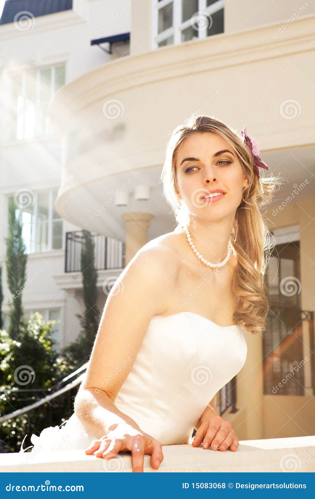 Young Bride Leaning Over Railing Stock Photo - Image of adult, long ...