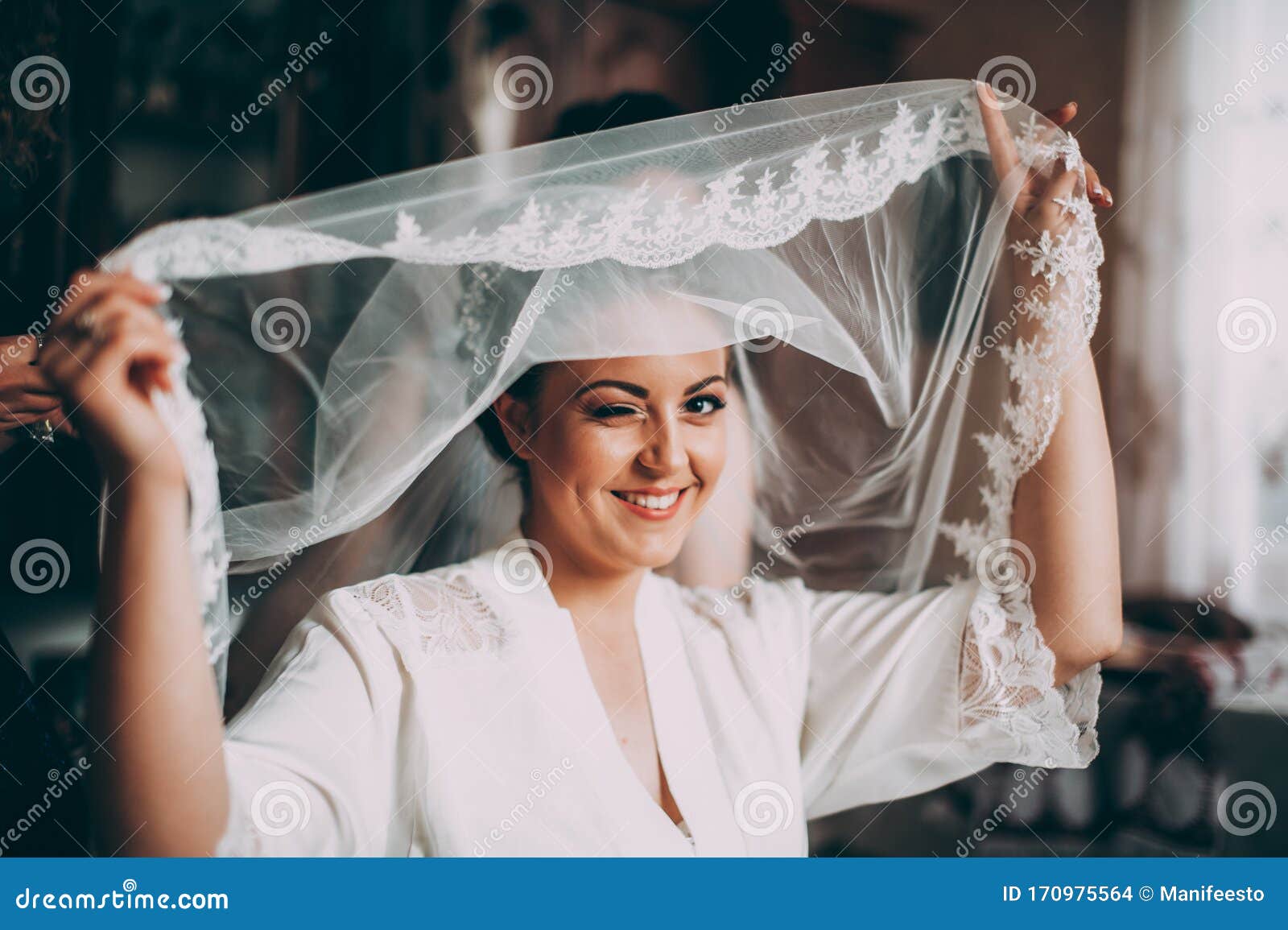 Bride Posing while Having Her First Shots of Bridal Preparation. Modern ...