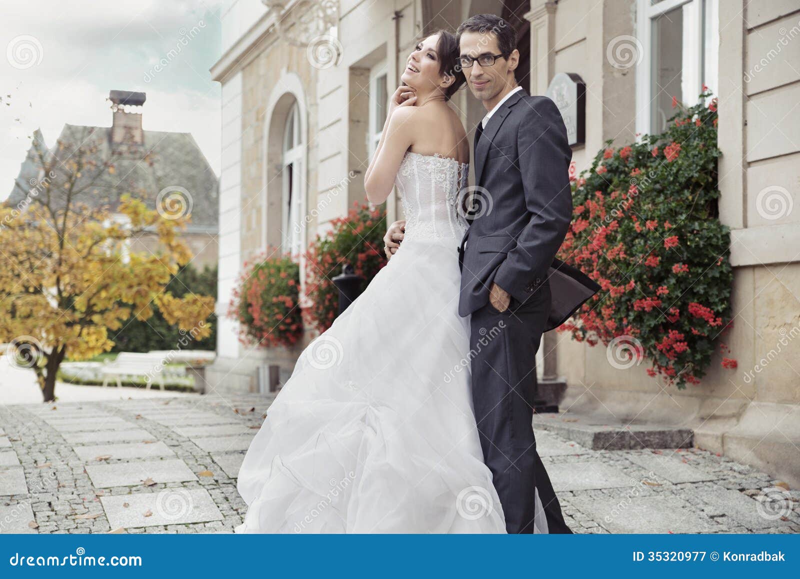 Young bride in tender hug stock image. Image of affection - 35320977