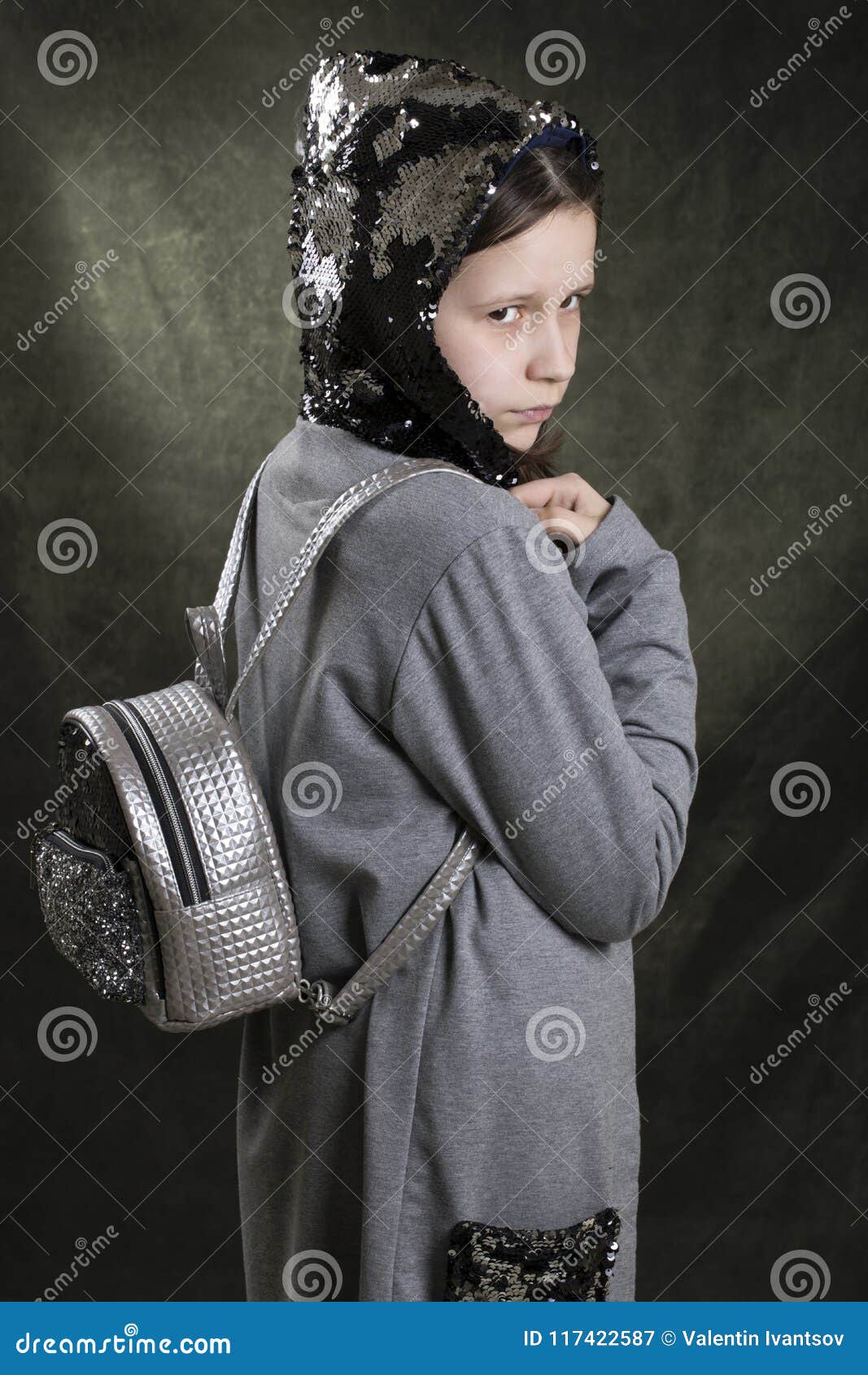 Young Bright Model with a Backpack on the Back Poses Stock Image ...