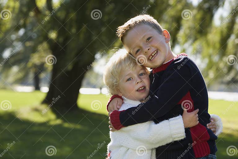 Young brothers hugging stock photo. Image of blond, family - 7396498