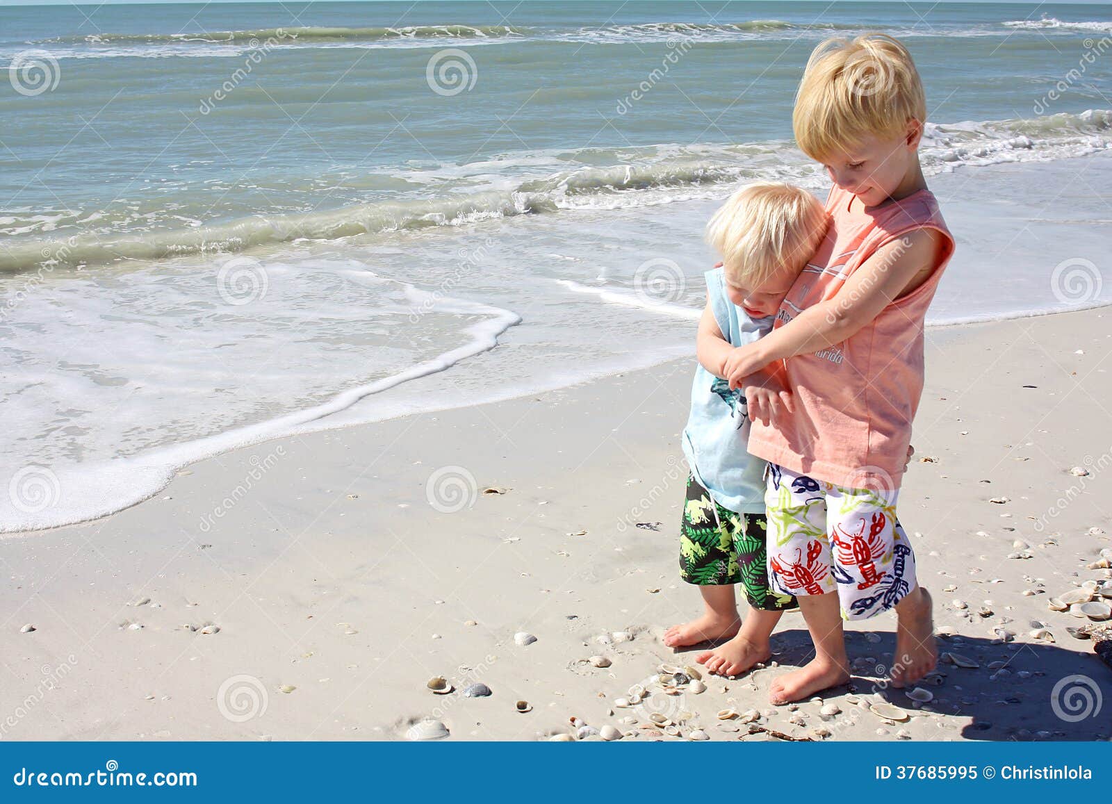 Young Brothers Walking Together on Beach Stock Image - Image of sandbox ...