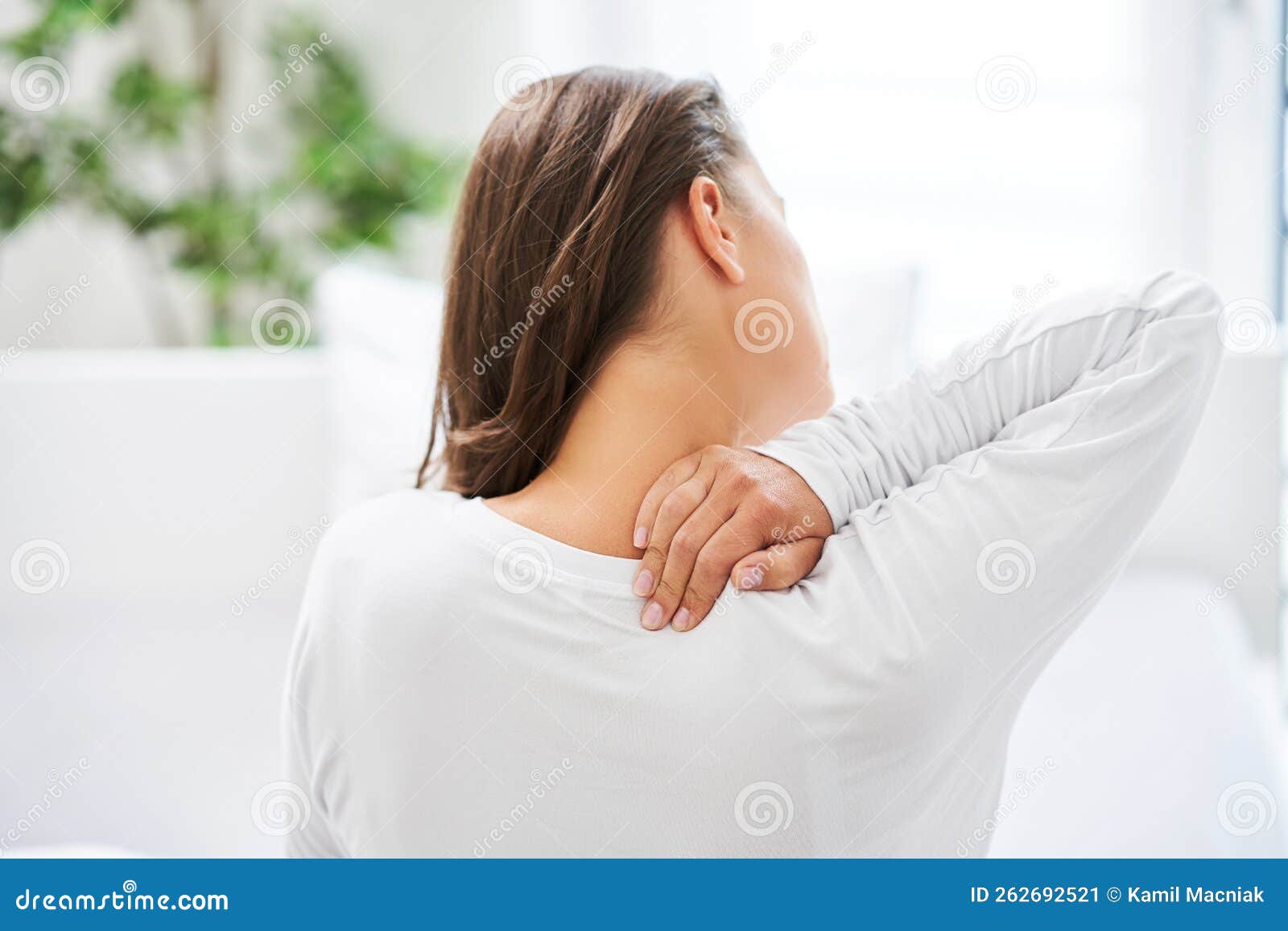 Young Brunet Woman Withe Her Back Problem in the Bed Stock Image ...