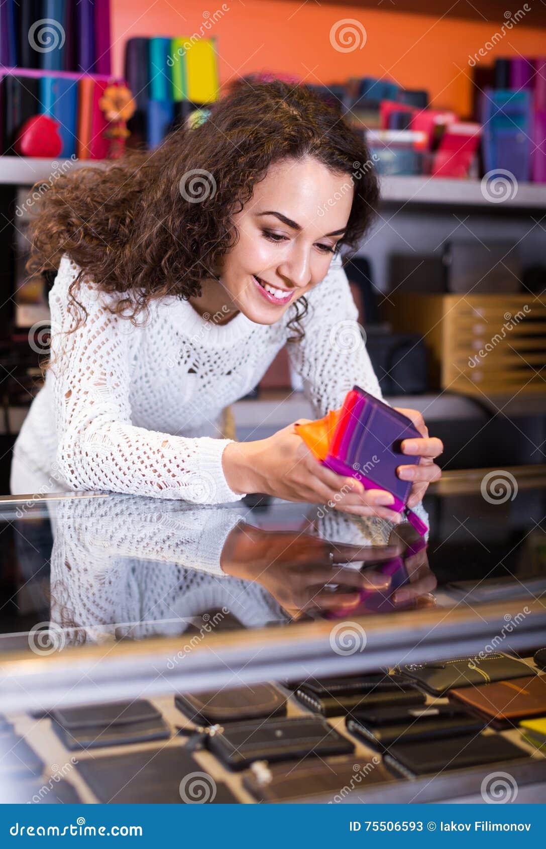 Young Brunette Choosing Purse with Many Sections in Store Stock Image ...