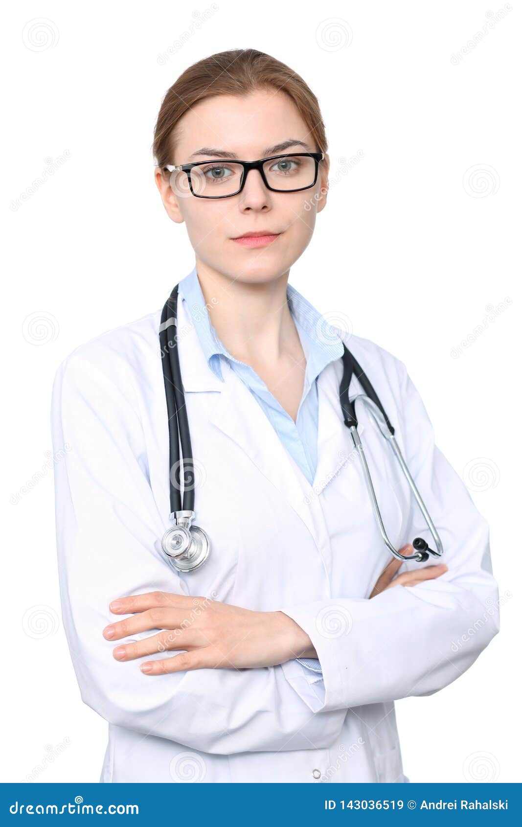 Young Brunette Female Doctor Standing With Arms Crossed Over White