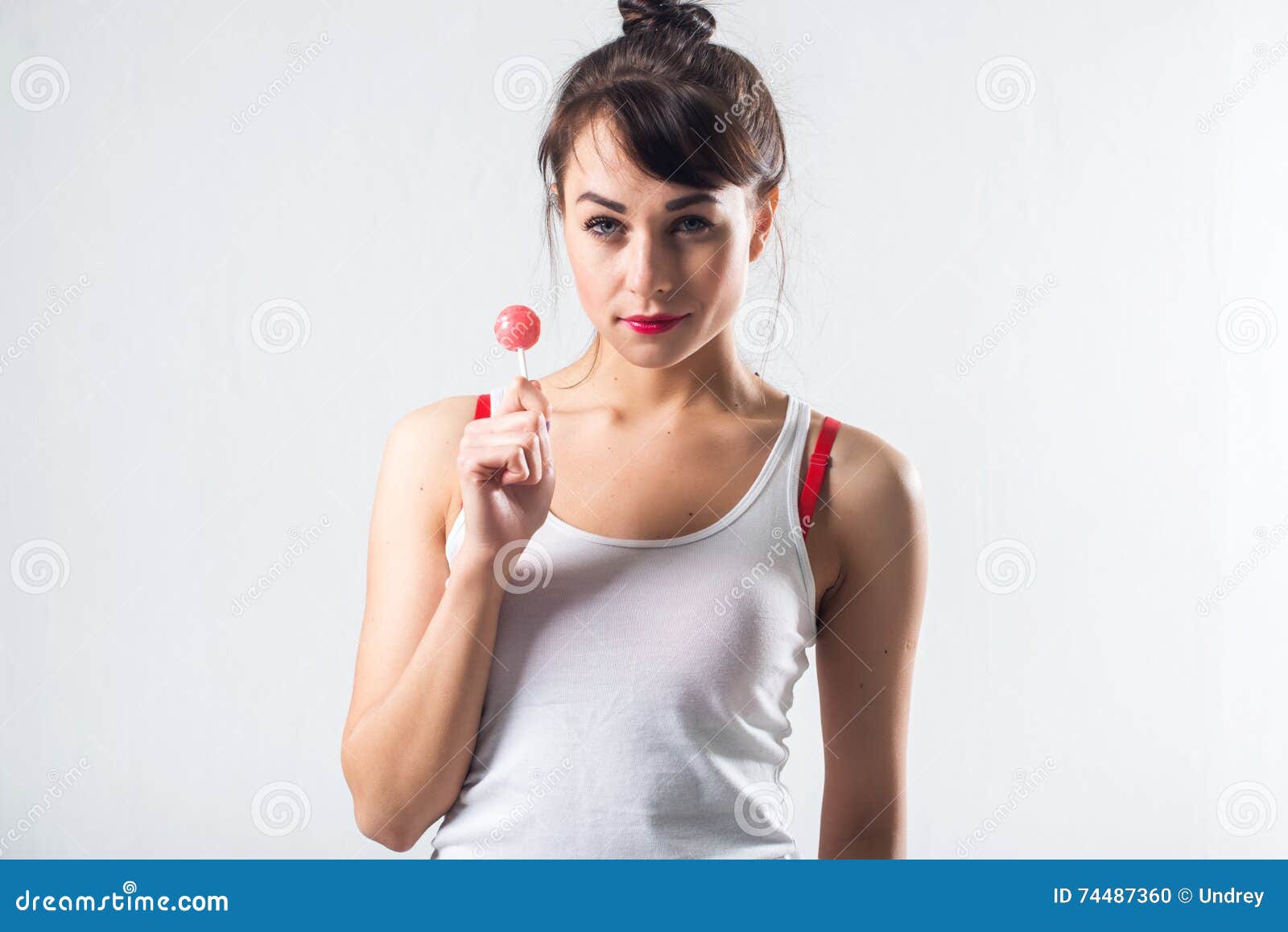 Young Brunette Model with Lollipop Posing Studio Shot on White ...