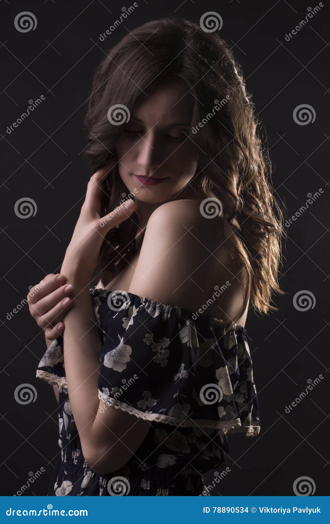 Young Brunette Model Looking Down at the Studio Stock Photo - Image of ...