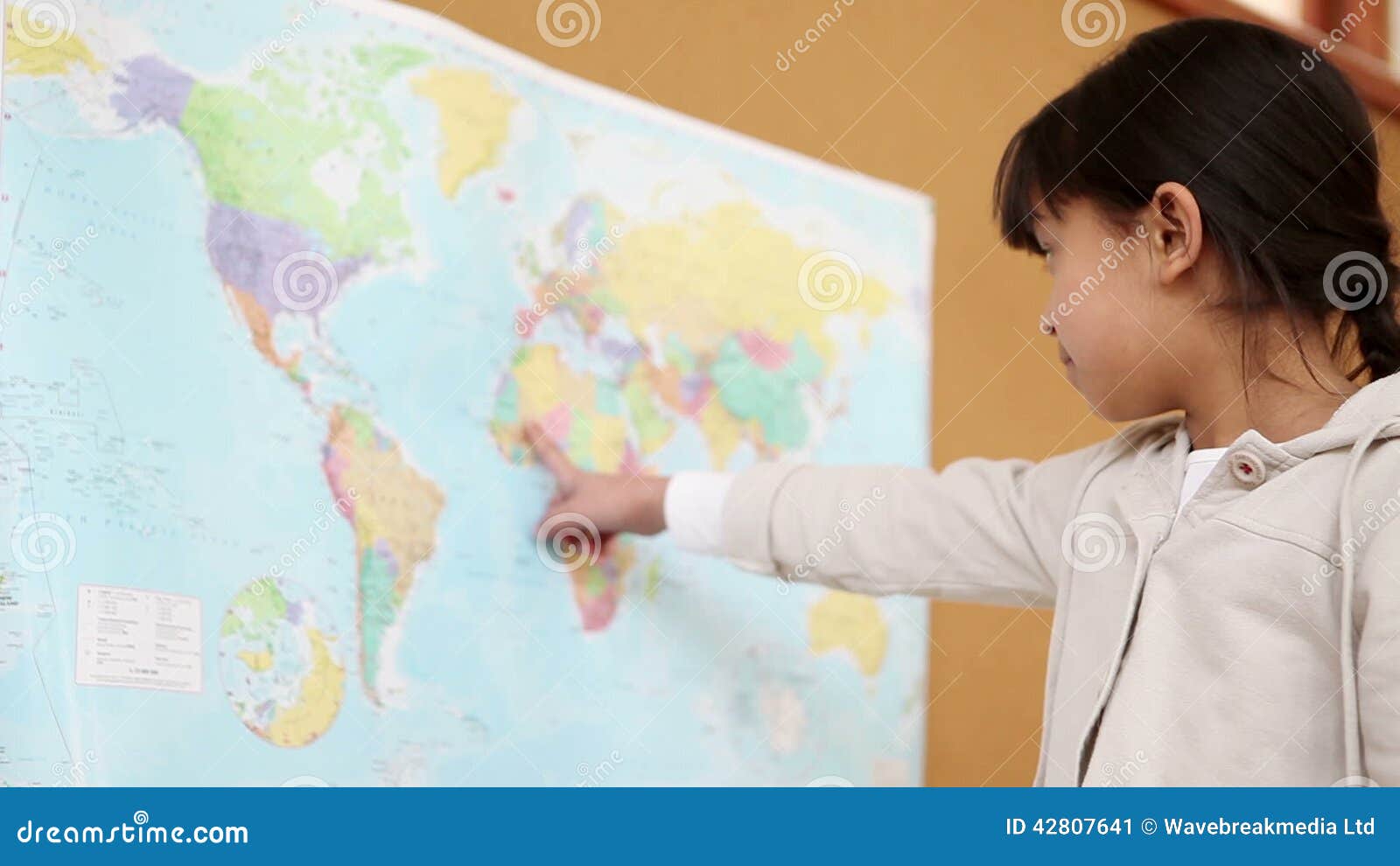 Young Brunette Pointing a World Map Stock Video - Video of school ...