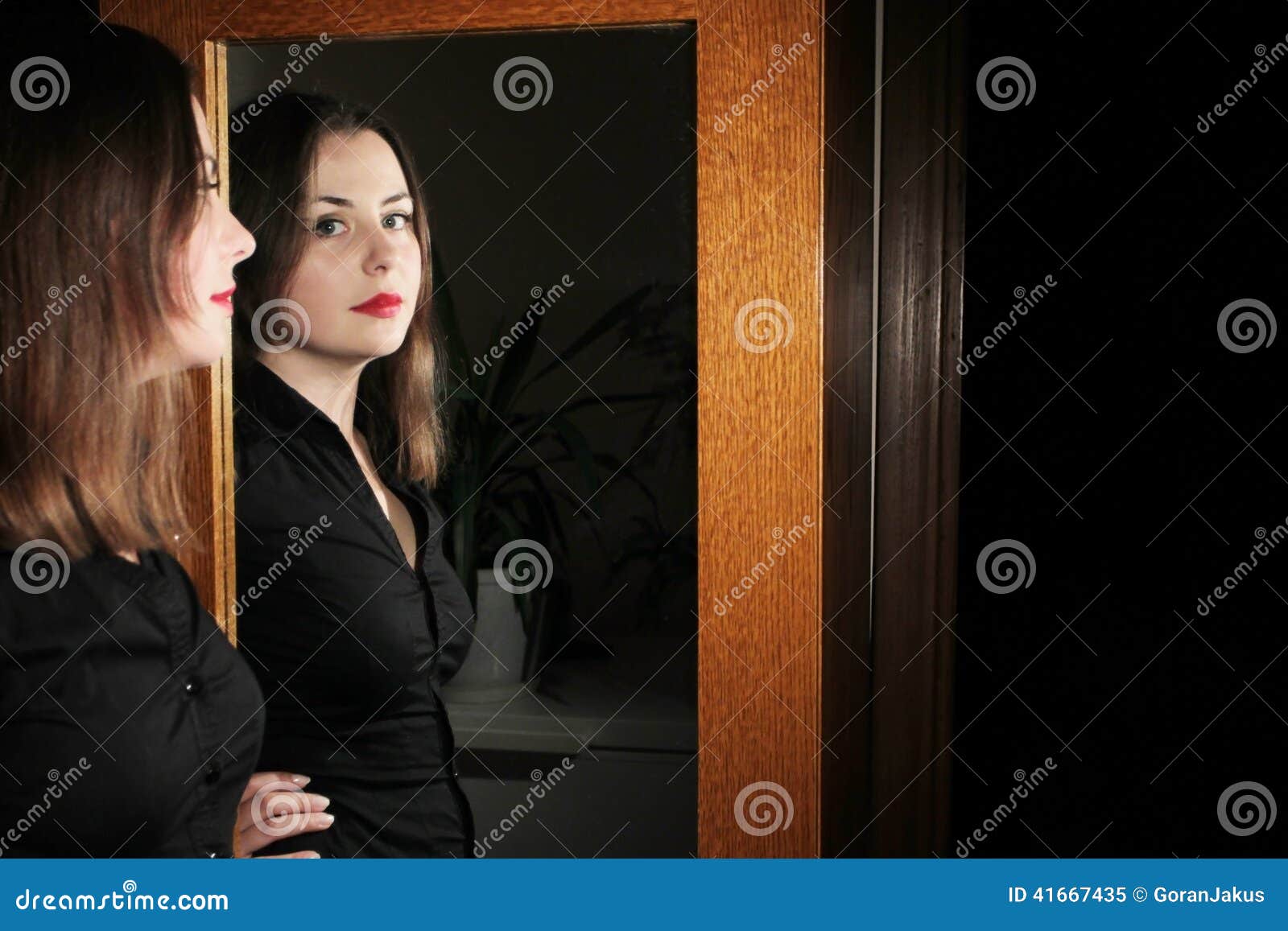 Young Brunette Posing in Front of Mirror Stock Image - Image of makeup ...