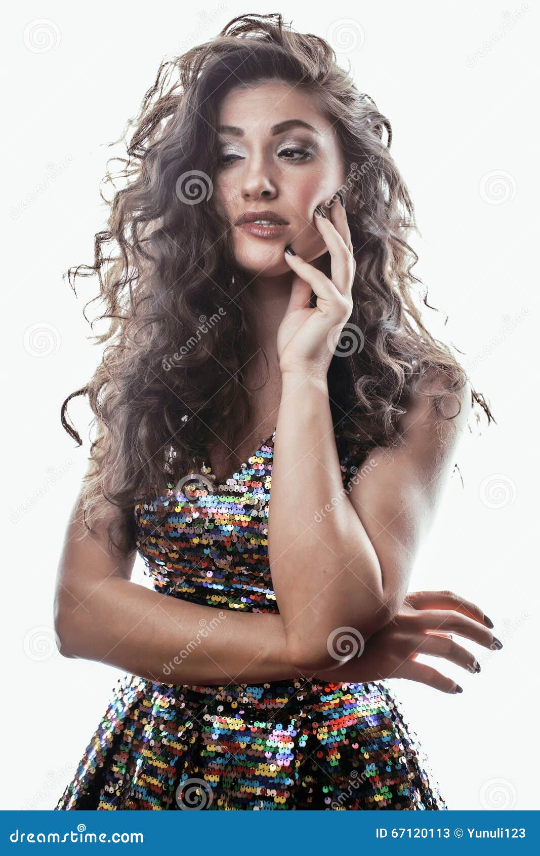 Young Brunette Woman With Curly Hairstyle In Fancy Glamur Dress