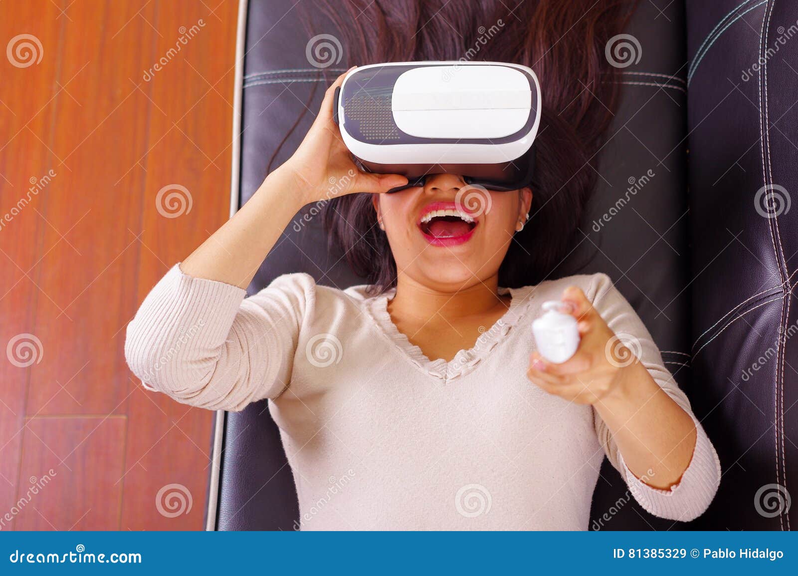 Young Brunette Woman Lying Down Wearing Virtual Reality Goggles ...