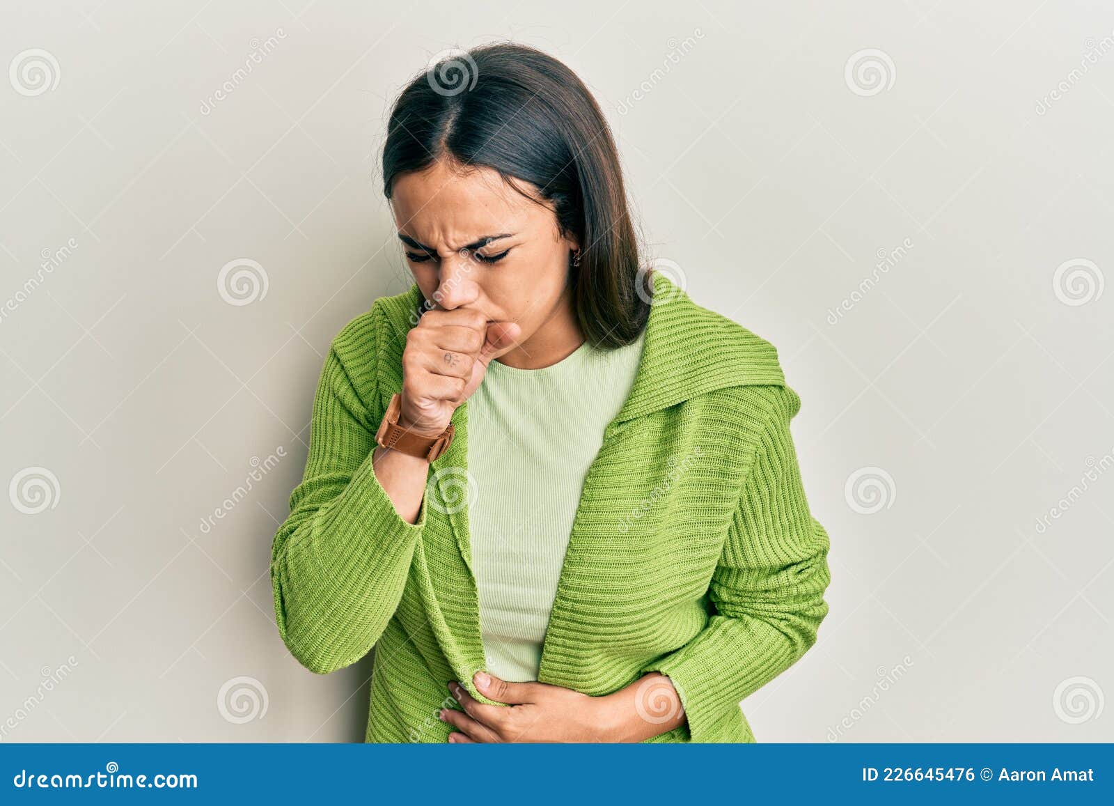 Young Brunette Woman Wearing Casual Clothes Feeling Unwell And Coughing