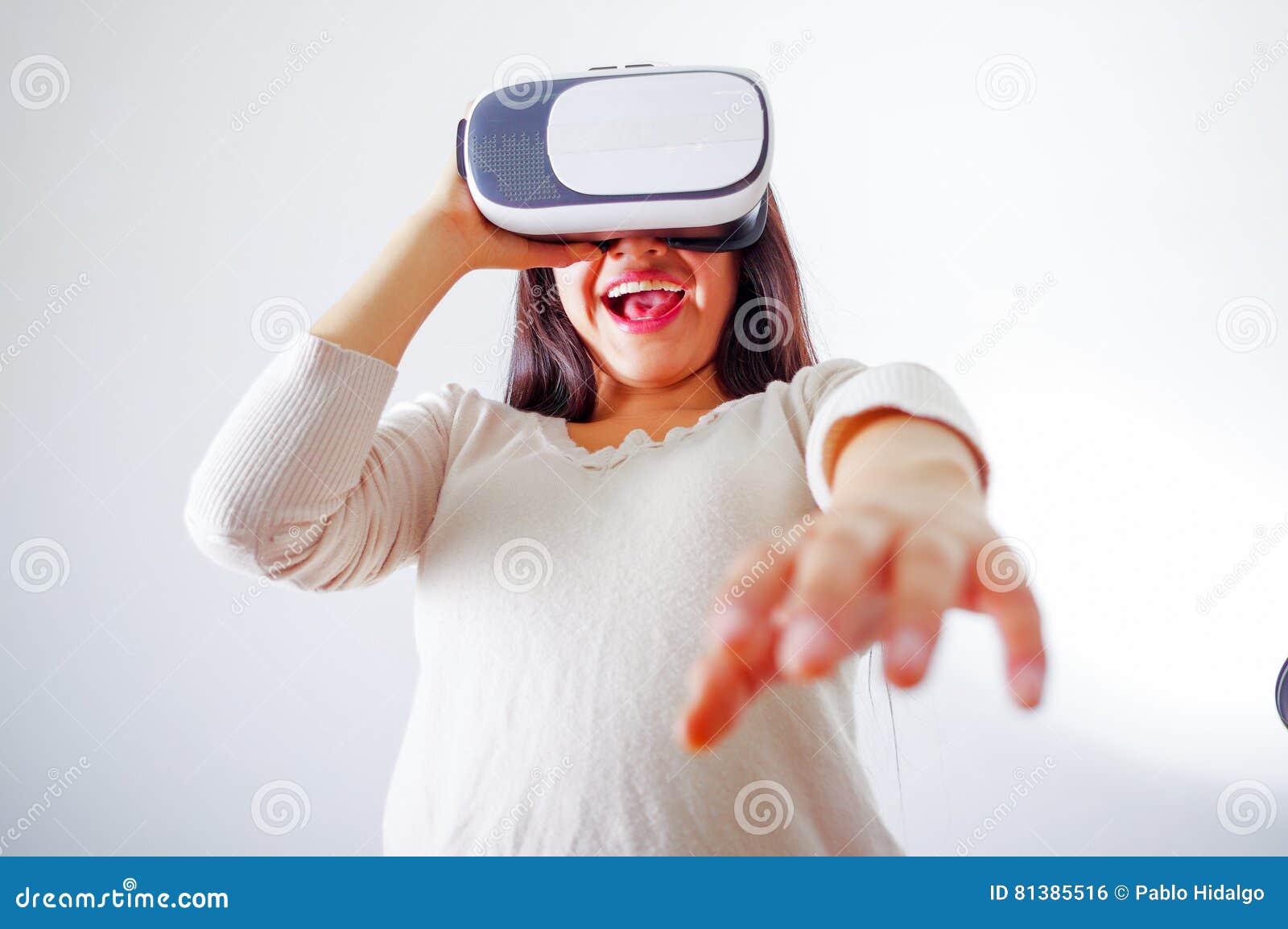 Young Brunette Woman Wearing Virtual Reality Goggles Experiencing ...