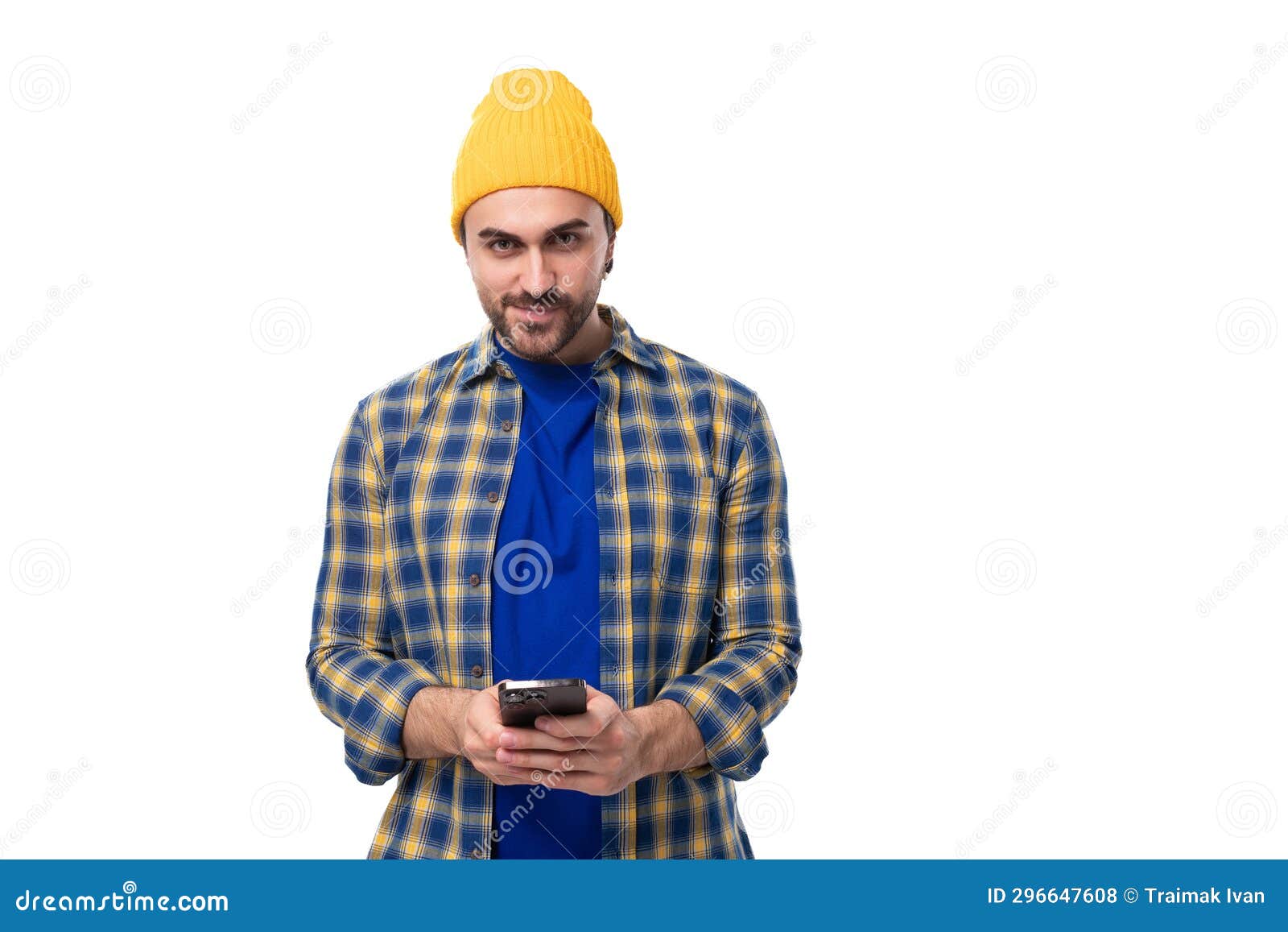 Young Brutal Brunette Man With A Beard And Mustache Chatting On A