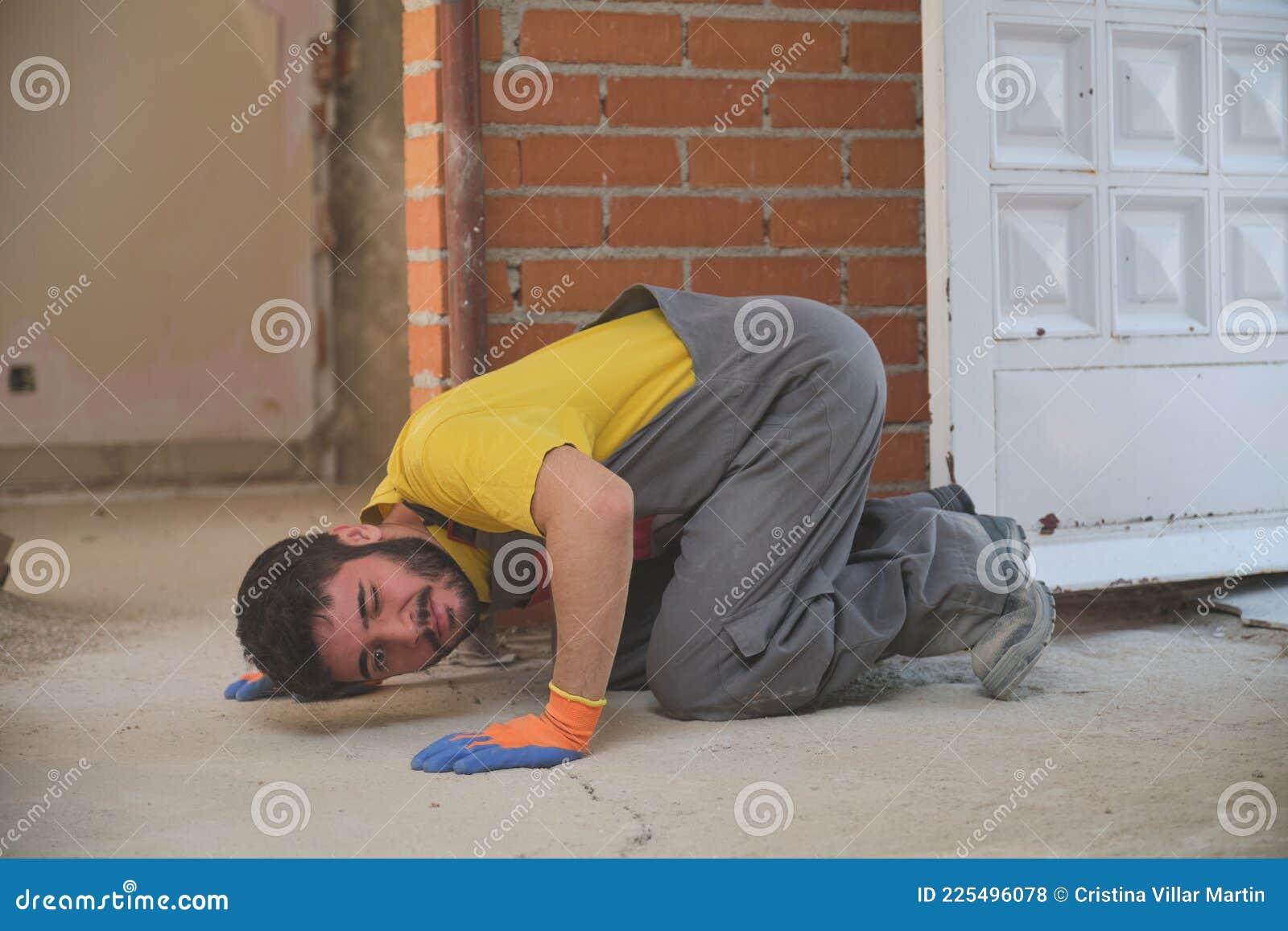 Young Builder Checking If the Floor is Flat Construction Site. Stock ... Young Builder Checking If the Floor is Flat Construction Site. Stock ...