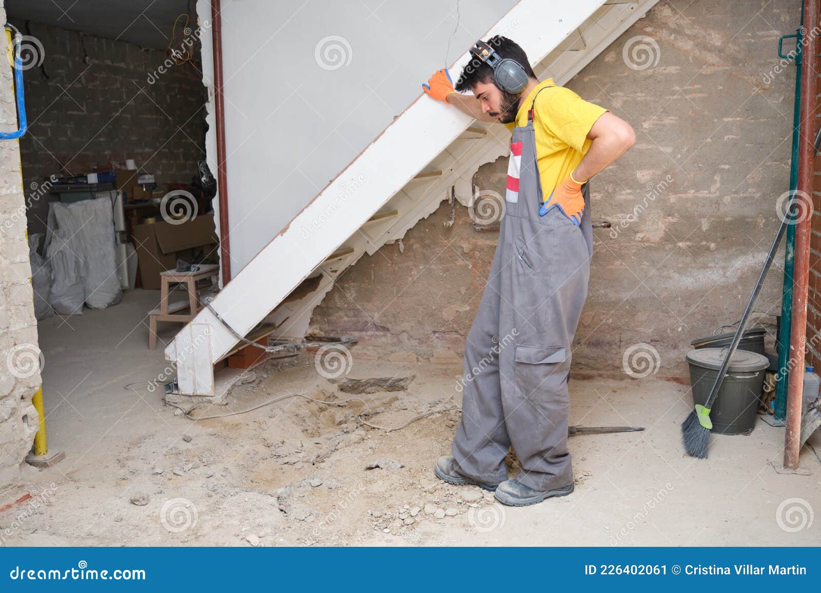 Young Builder Thinking How To Solve a Problem at the Construction Site ...