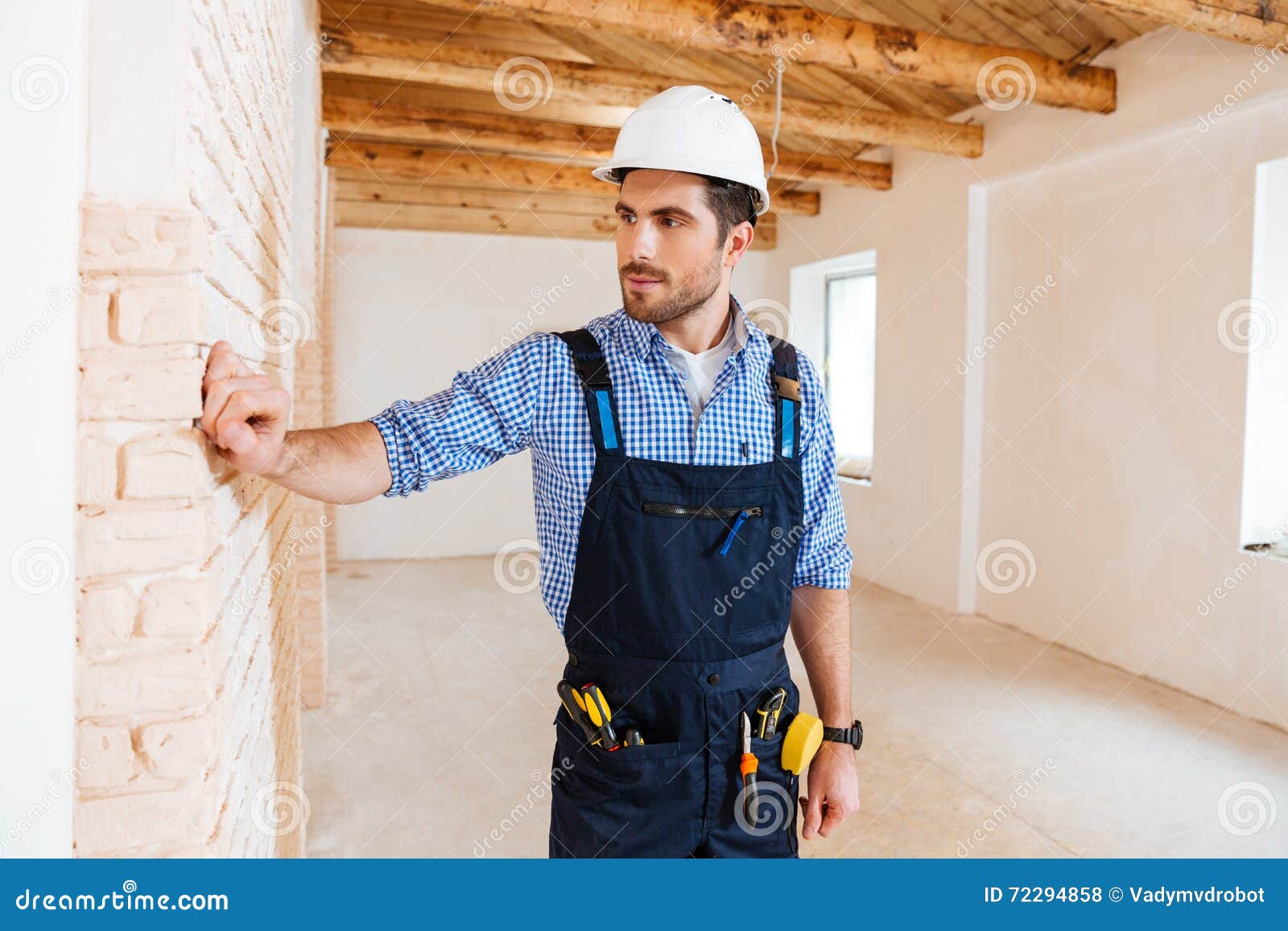 Young Builder Thinking about Something Indoors Stock Photo - Image of ...