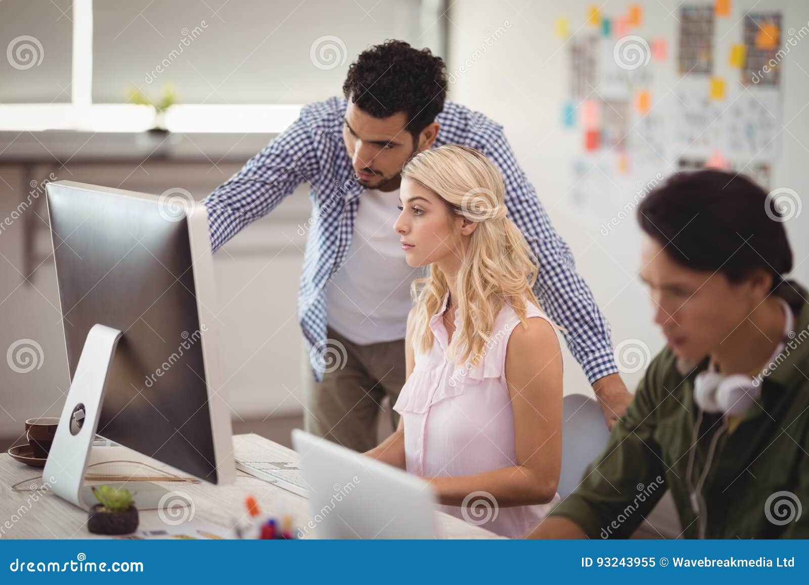 Young Business Colleagues Working on Desktop Pc at Office Desk Stock ...