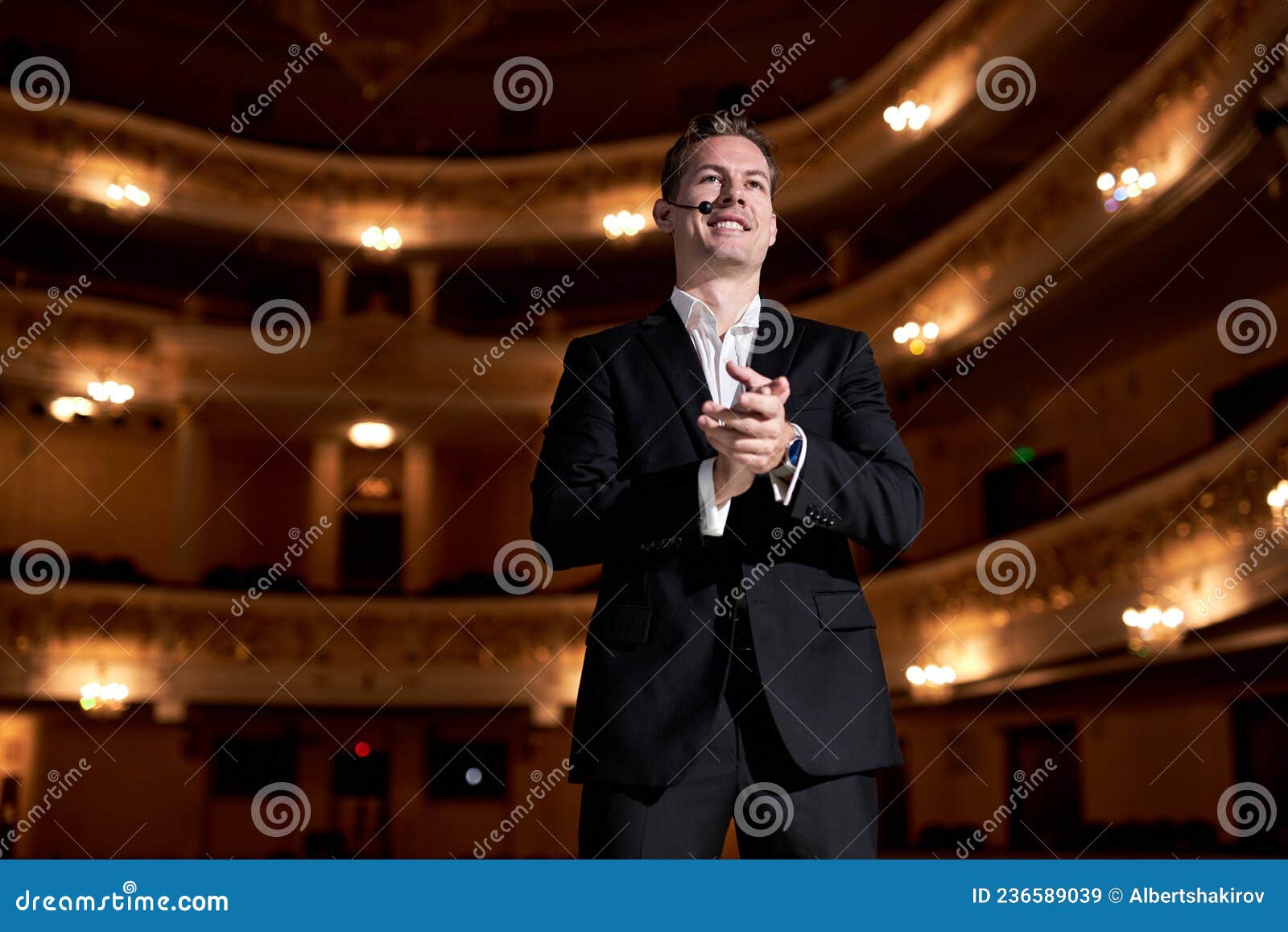 Young Business Couch Standing on Stage Clapping Hands, Keep Hands ...