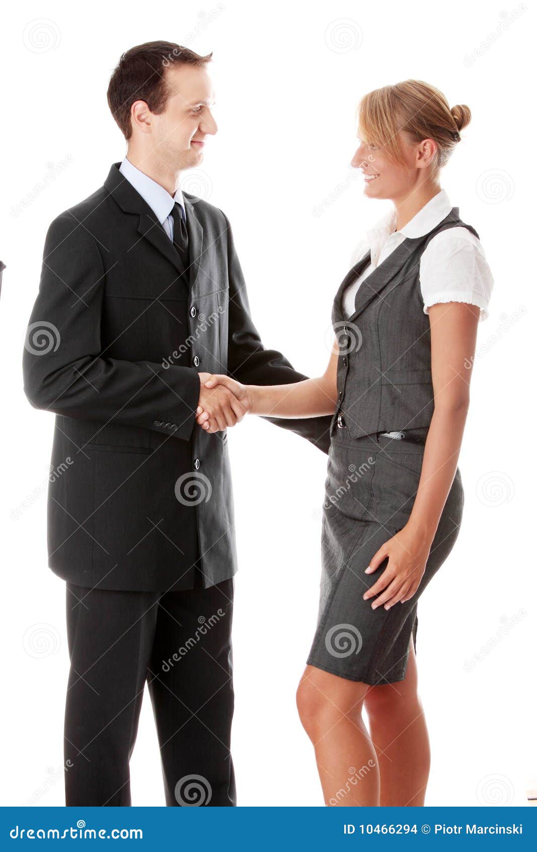 Young Business Couple Handshaking Stock Photo - Image of teamwork ...