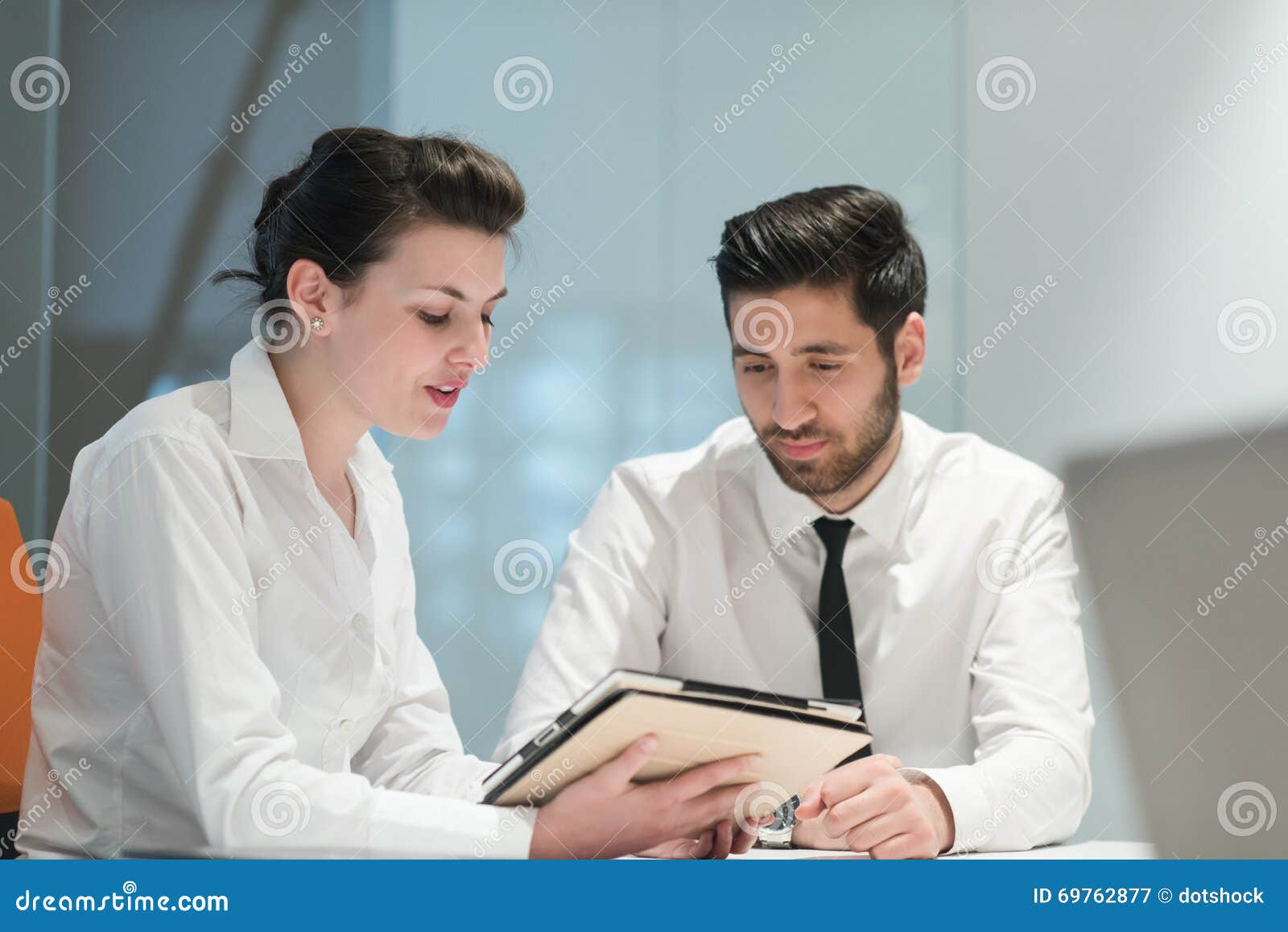 Young Business Couple Working Together on Project Stock Image - Image ...