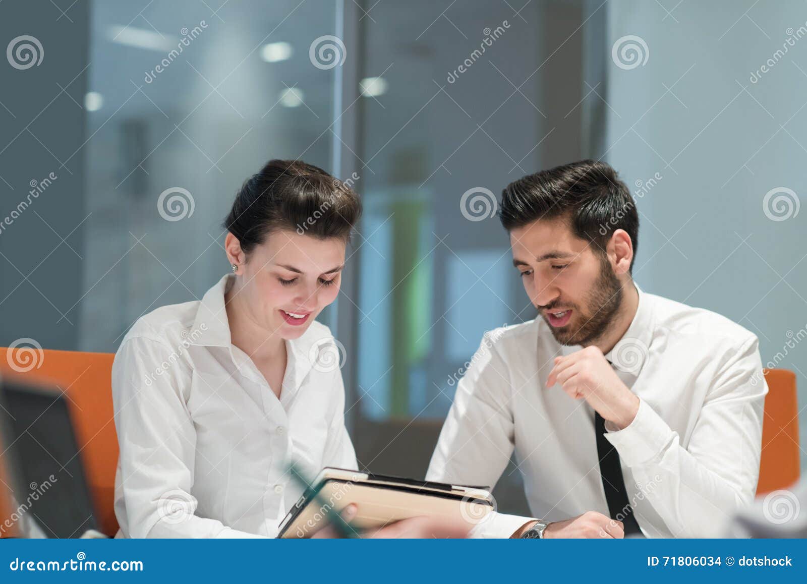 Young Business Couple Working Together on Project Stock Photo - Image ...