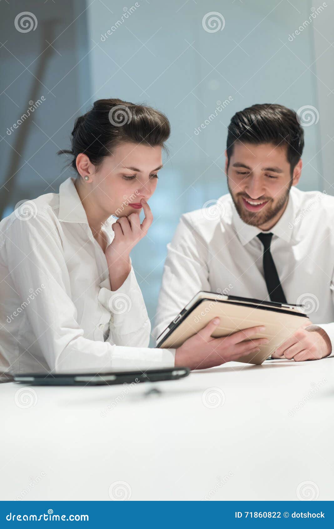 Young Business Couple Working Together on Project Stock Photo - Image ...
