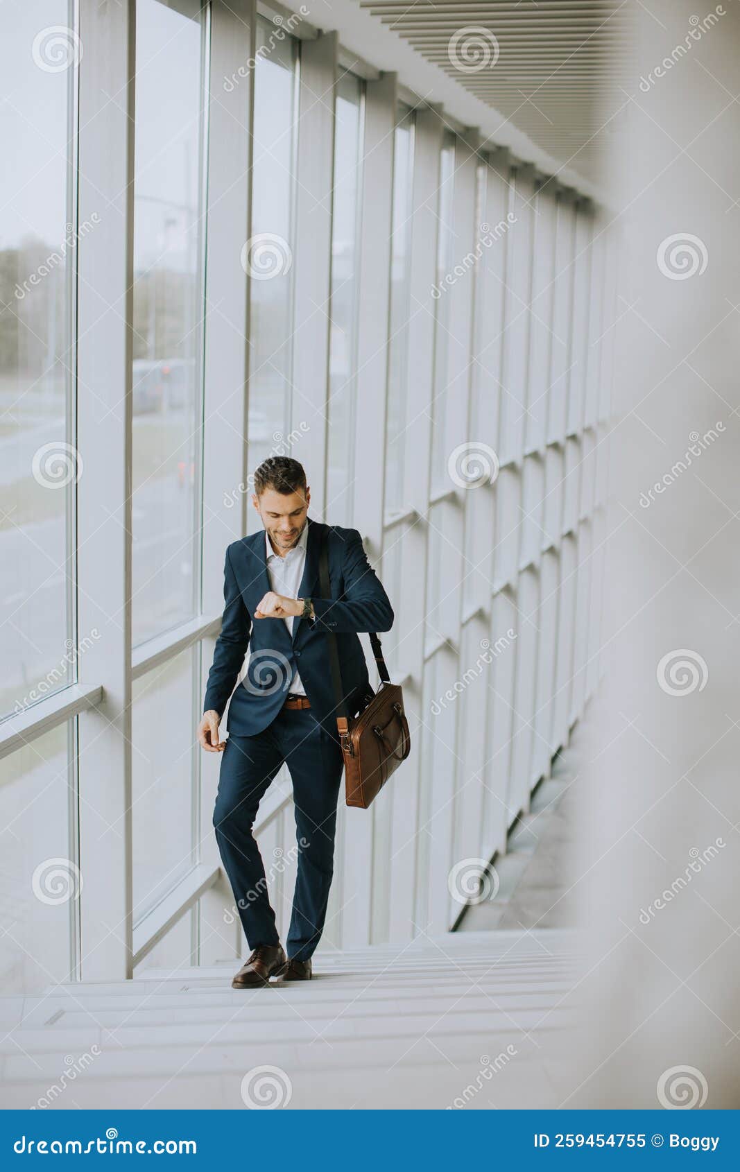 Young Business Executive with Briefcase Going Up the Stairs Stock Image ...