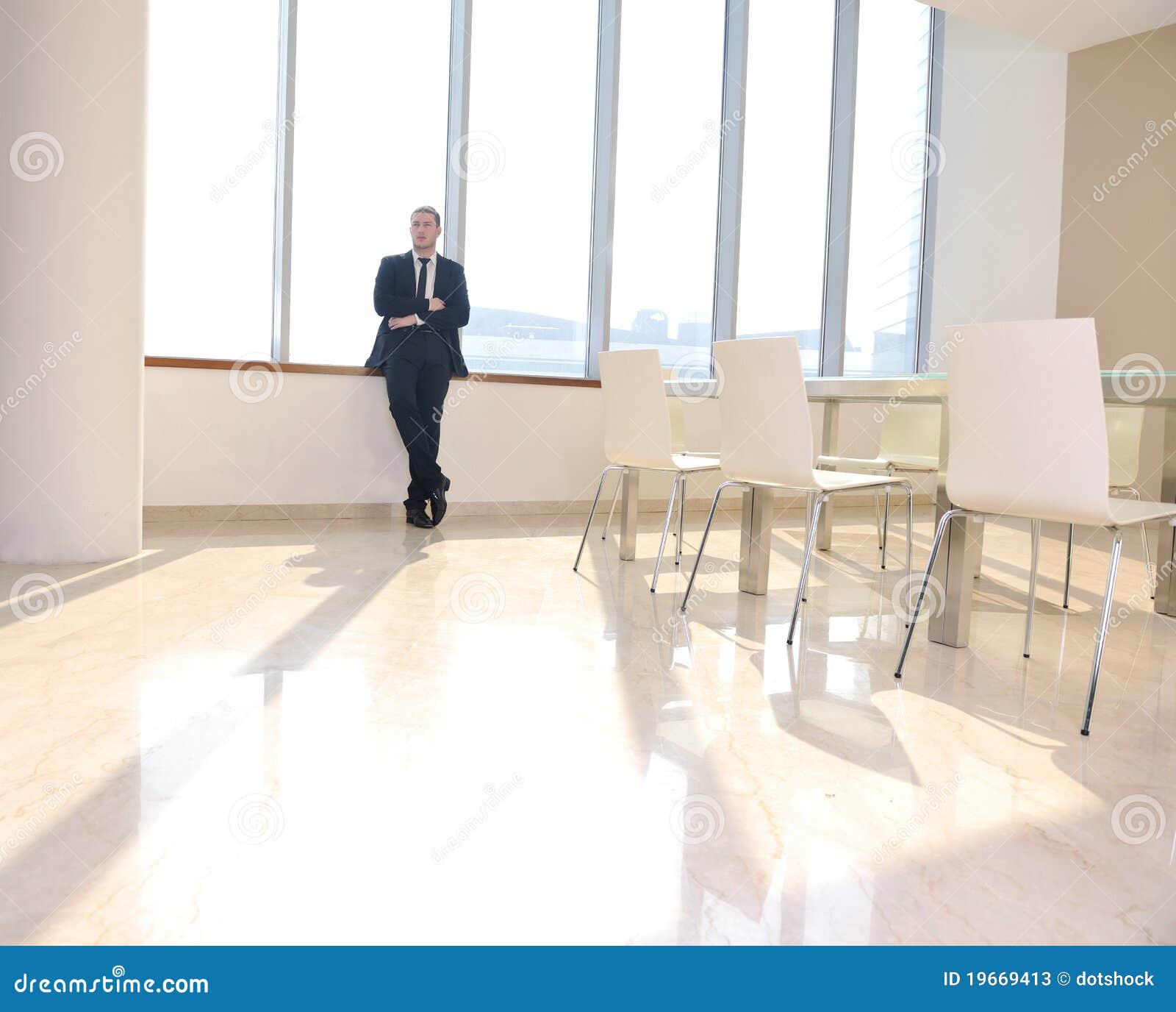Young Business Man Alone in Conference Room Stock Image - Image of ...